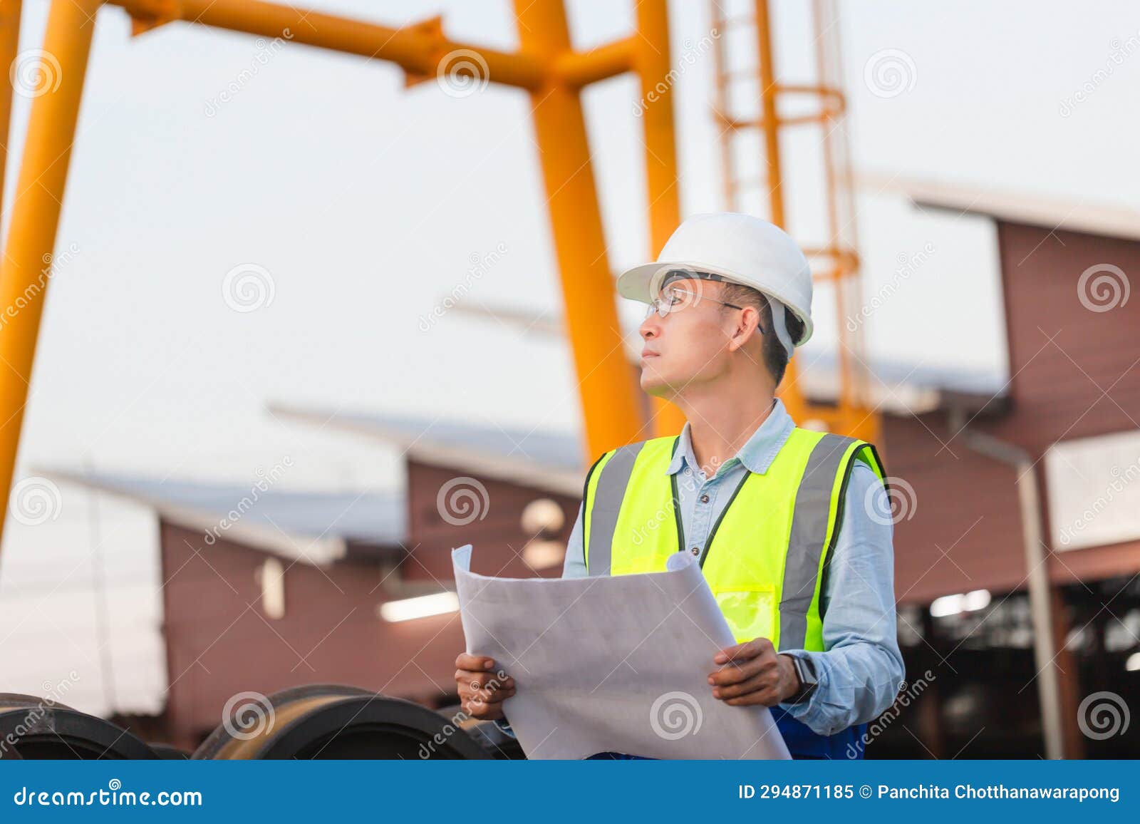Engineer Man In Waistcoats And Hardhats And With Documents In A Railway ...