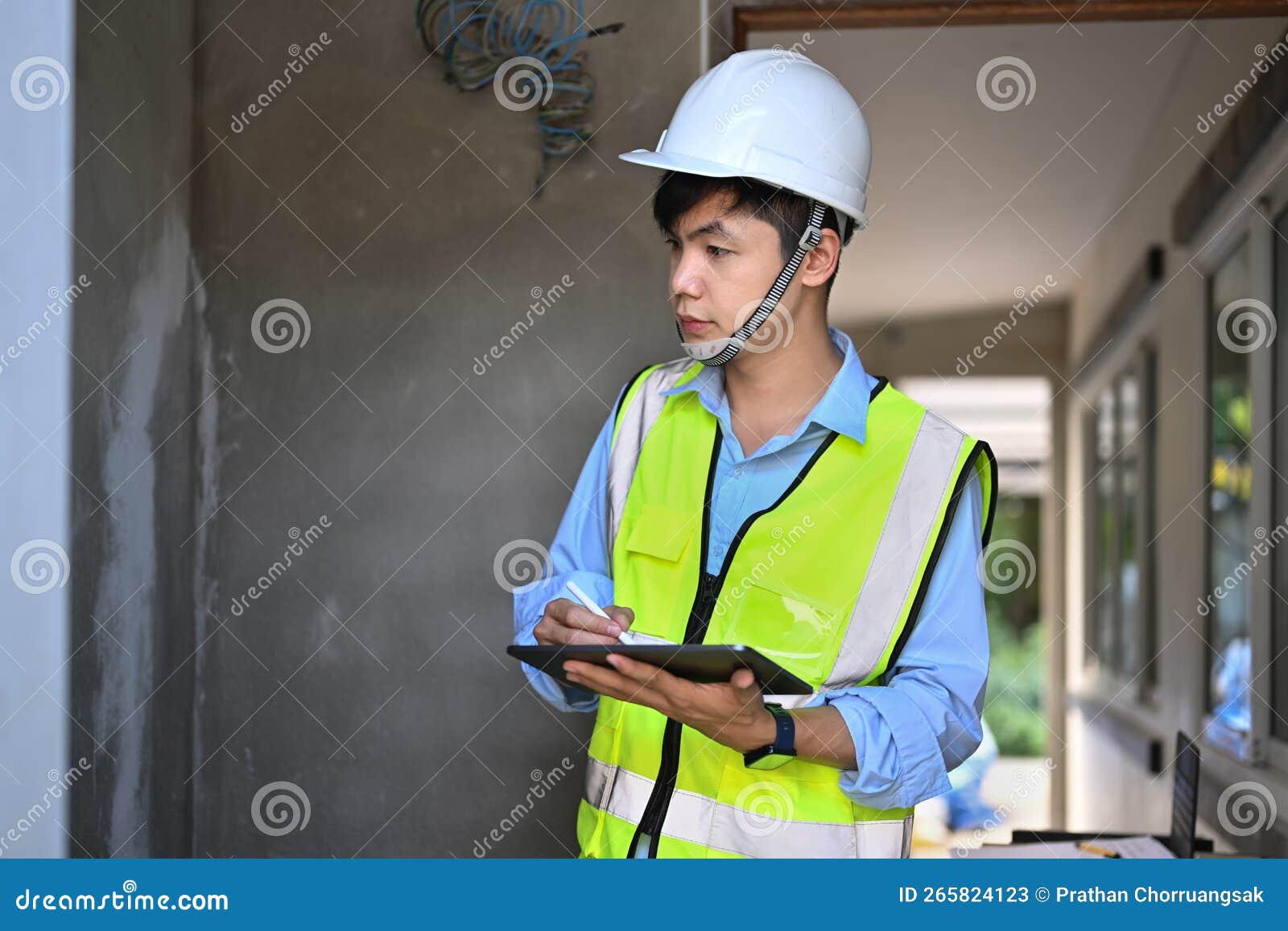 Engineer Man Wearing Safety Helmets Checking Building Structure with ...
