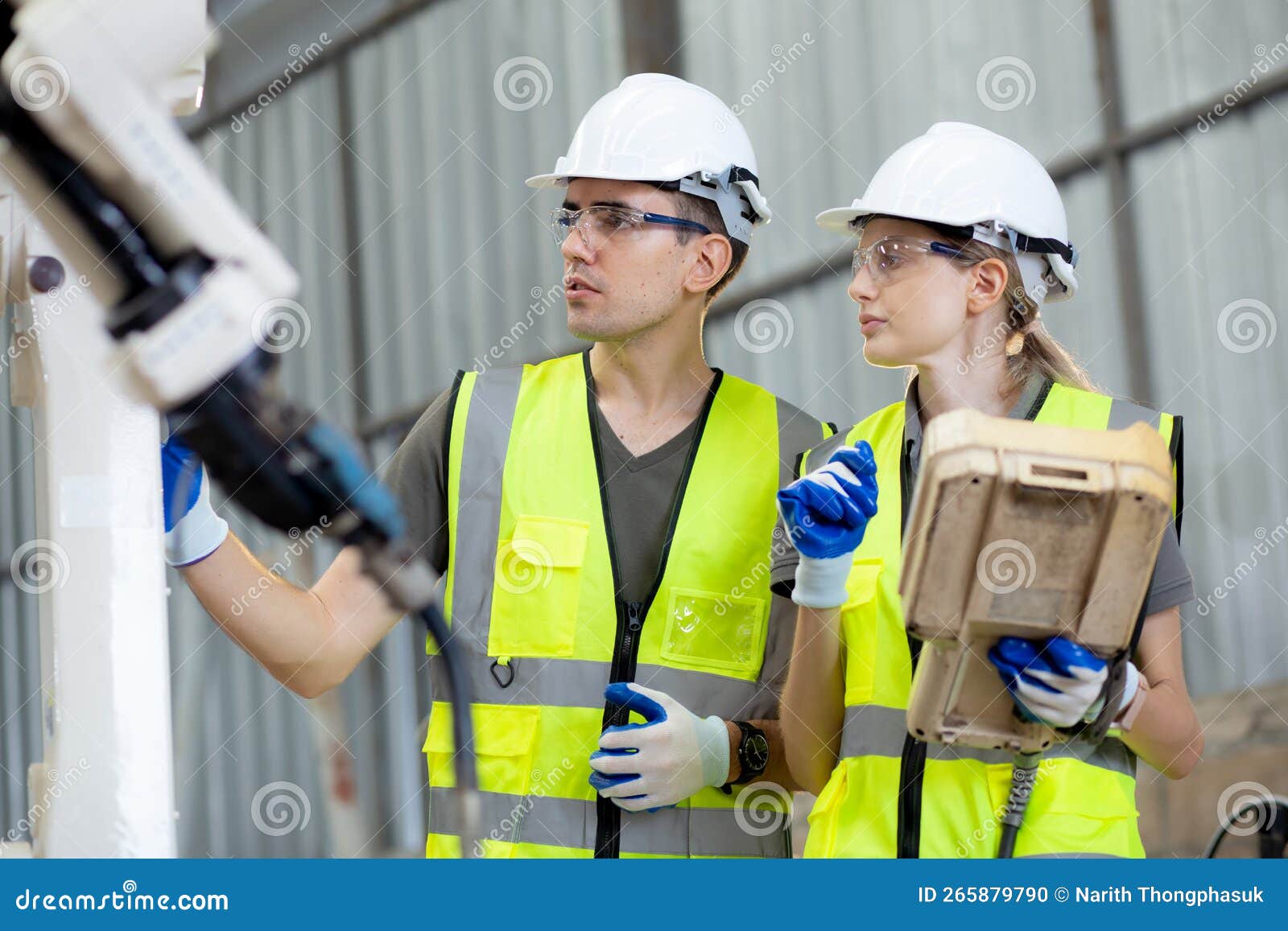 Engineer Man and Woman Talking and Explaining about Robot Arms ...