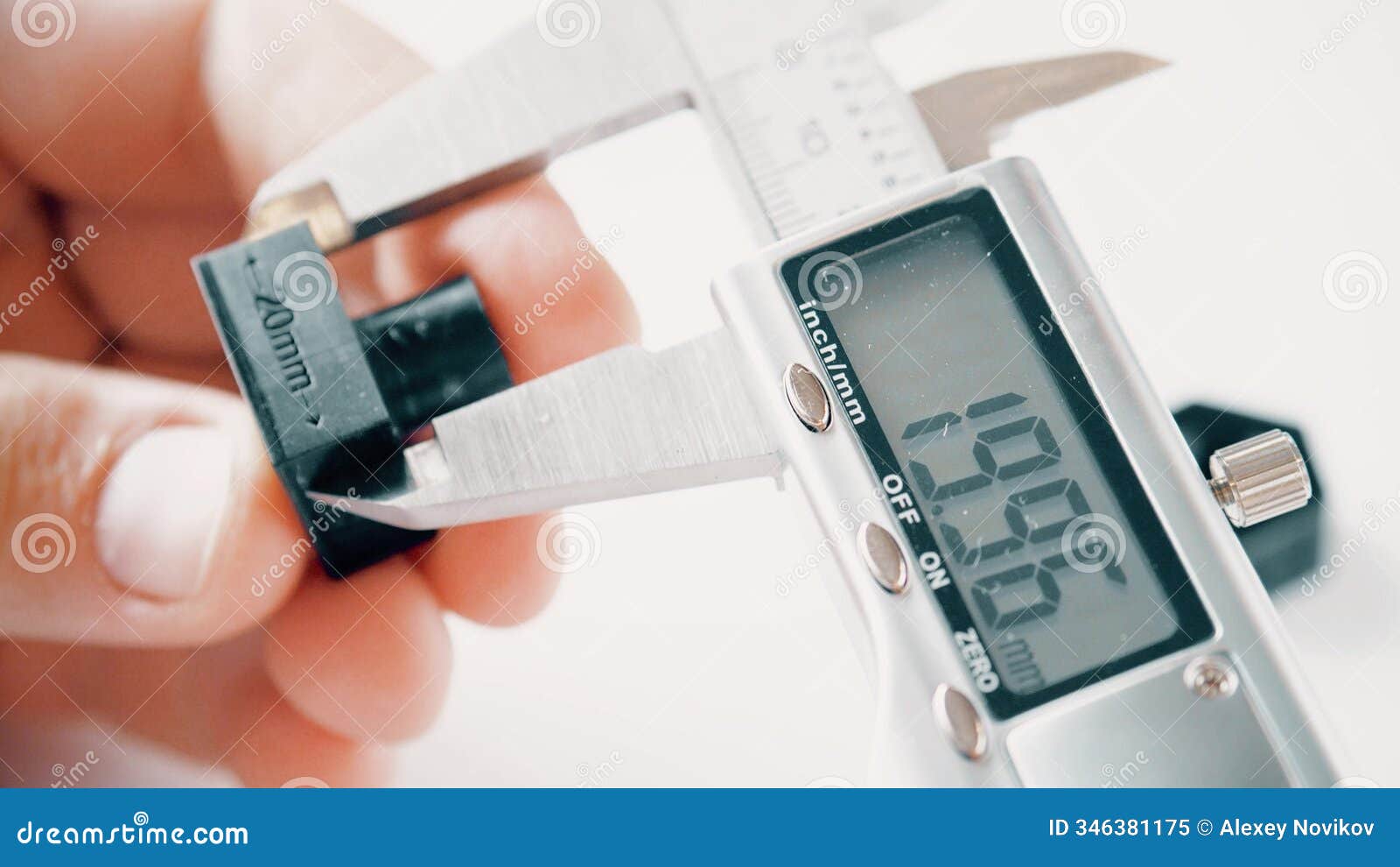 Engineer Measures 3D Printed Sample with an Electronic Caliper or ...