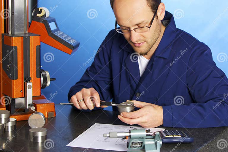 Engineer Measuring with Caliper Stock Photo - Image of mechanical ...