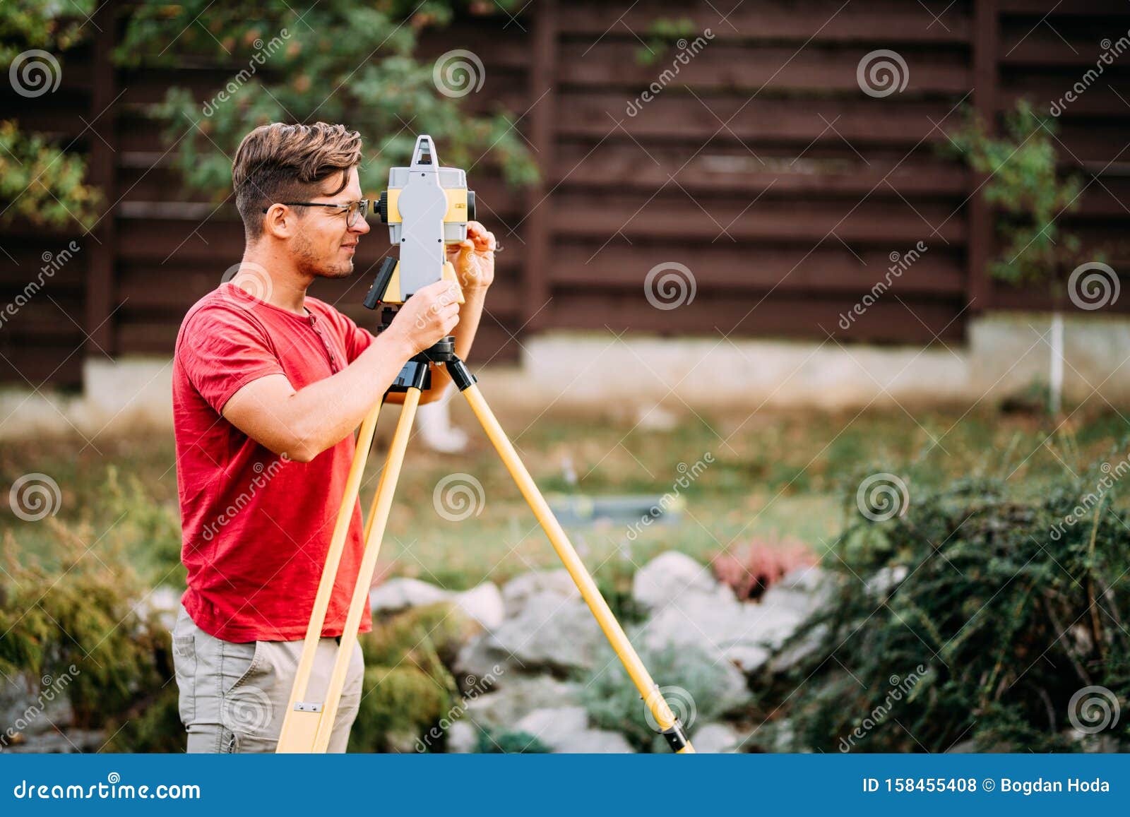 Engineer Measuring Ground Elevation on the Field Stock Photo - Image of ...