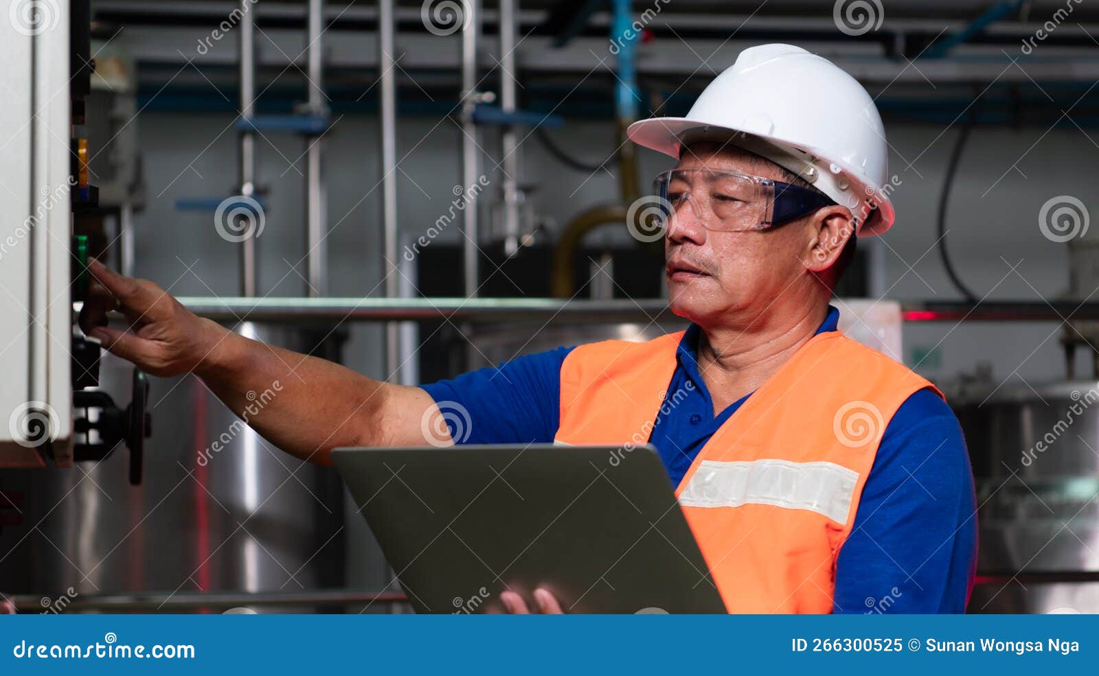 Engineer of Mechanical Plant Checking the Electronic Circuit of the ...