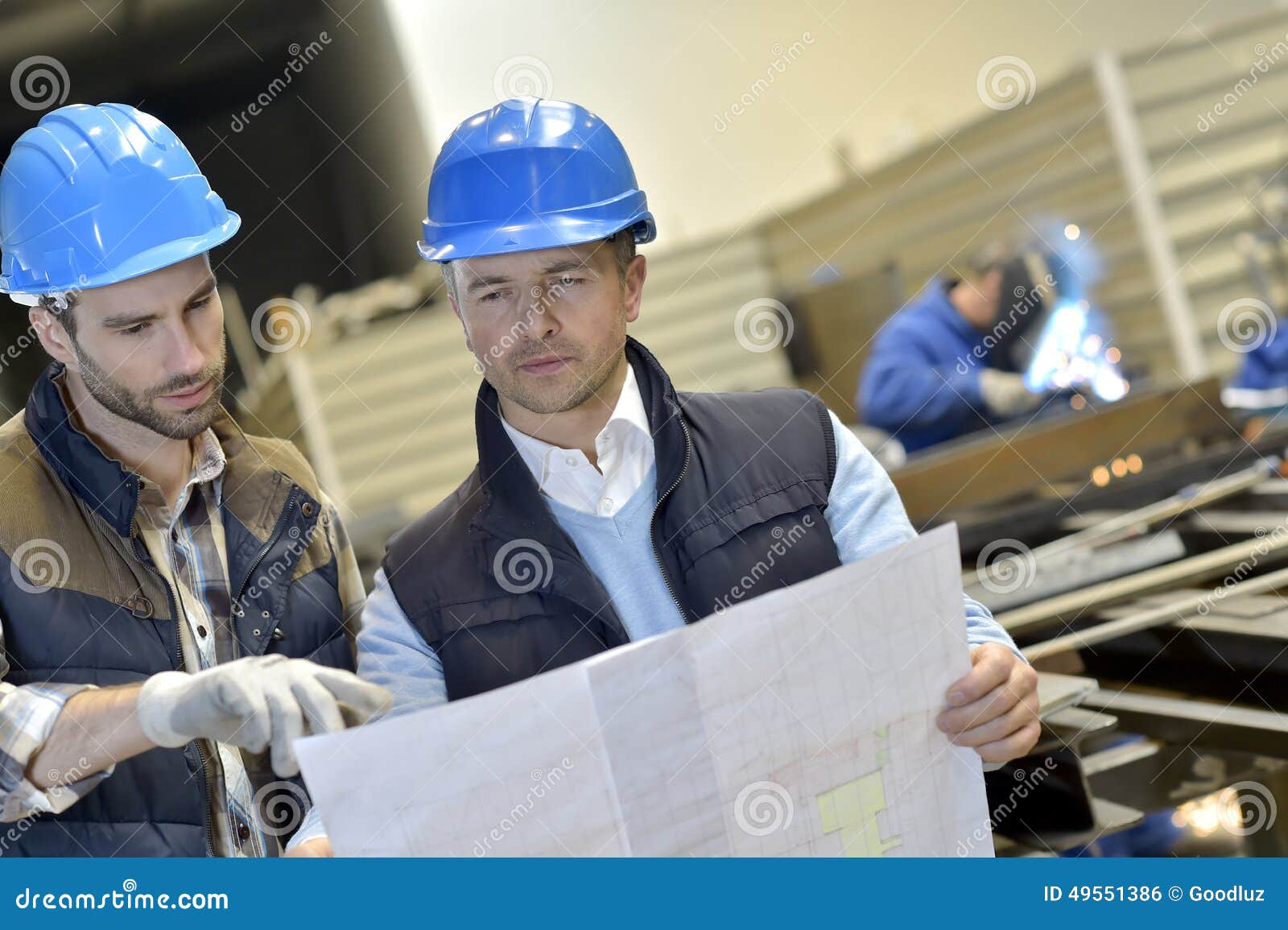 Engineer with Mechanical Worker in a Metallurgic Factory Stock Photo ...