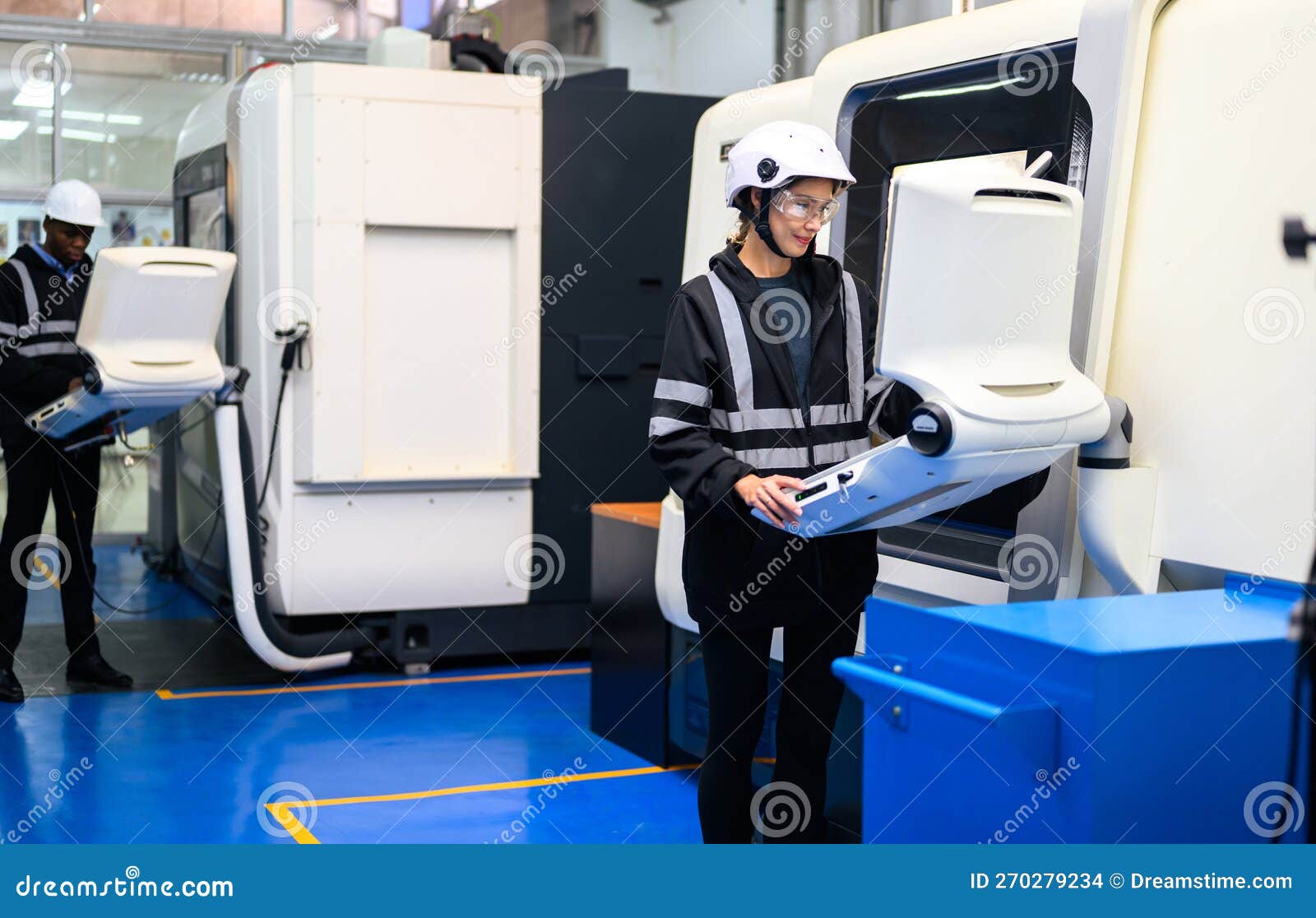 Engineer Mechanician Operating and Controlling CNC Machine Stock Photo ...