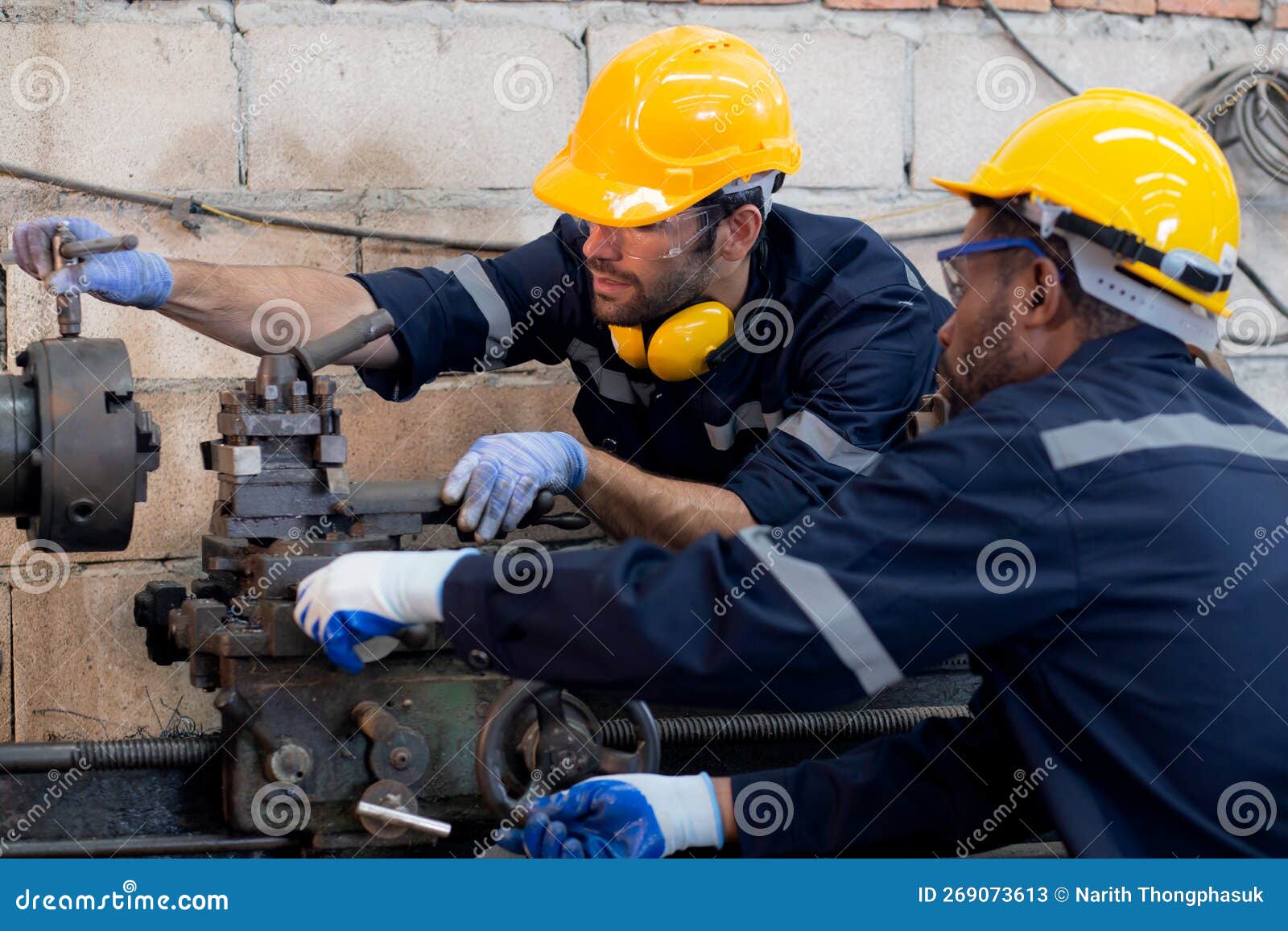 Engineer Man Training with Foreman for Apprentice Using Lathe ...
