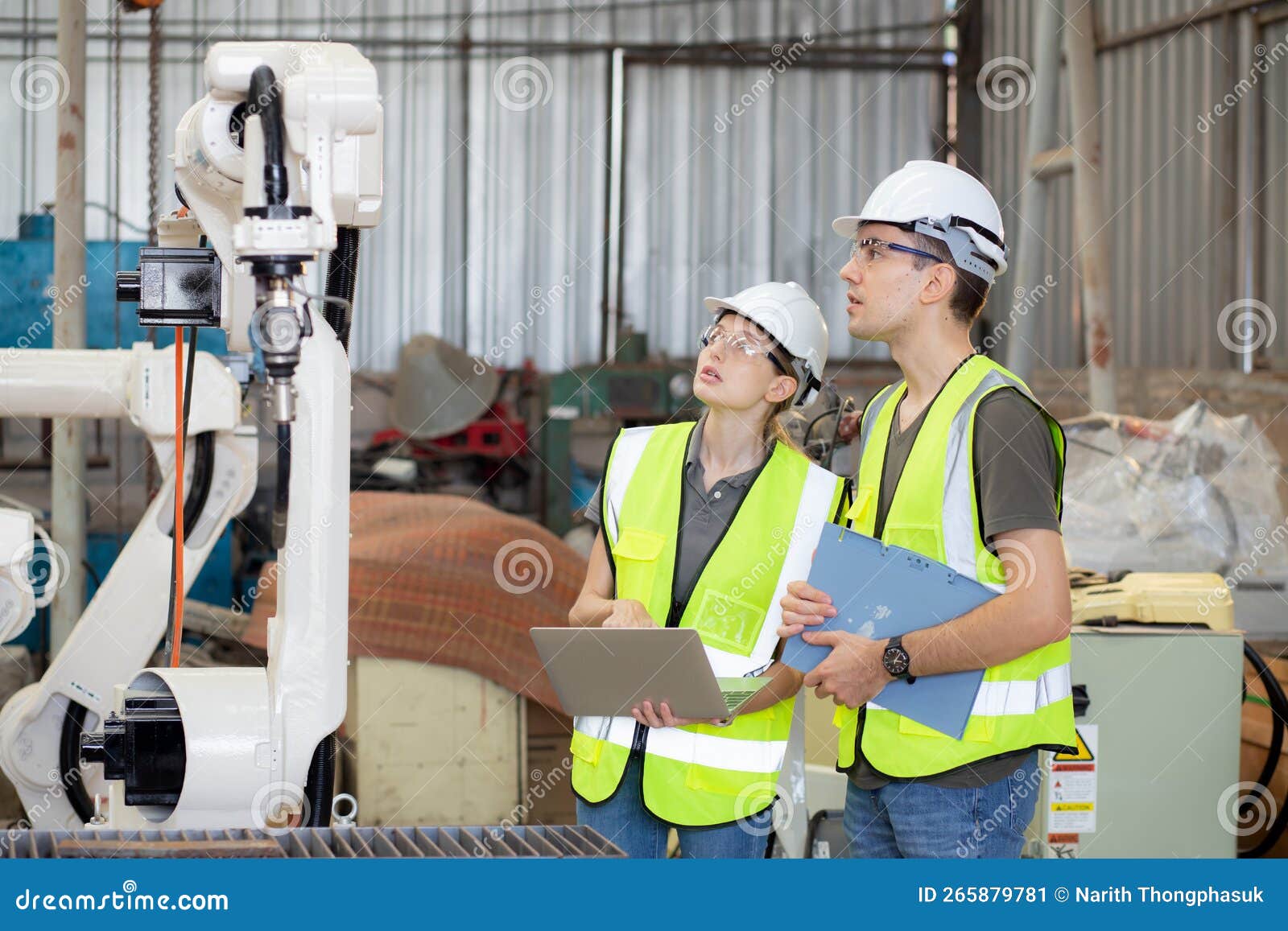 Engineer Man and Woman Talking and Explaining about Robot Arms ...