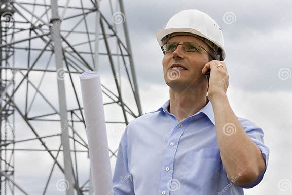 Engineer with mobile phone stock image. Image of phone - 10776527
