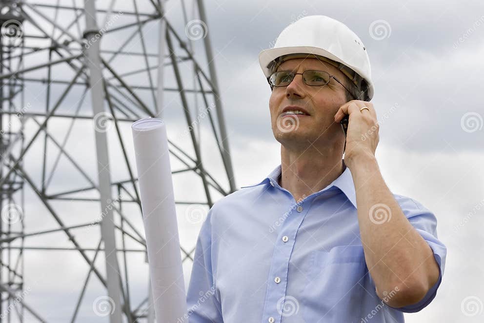Engineer with mobile phone stock image. Image of phone - 10776527