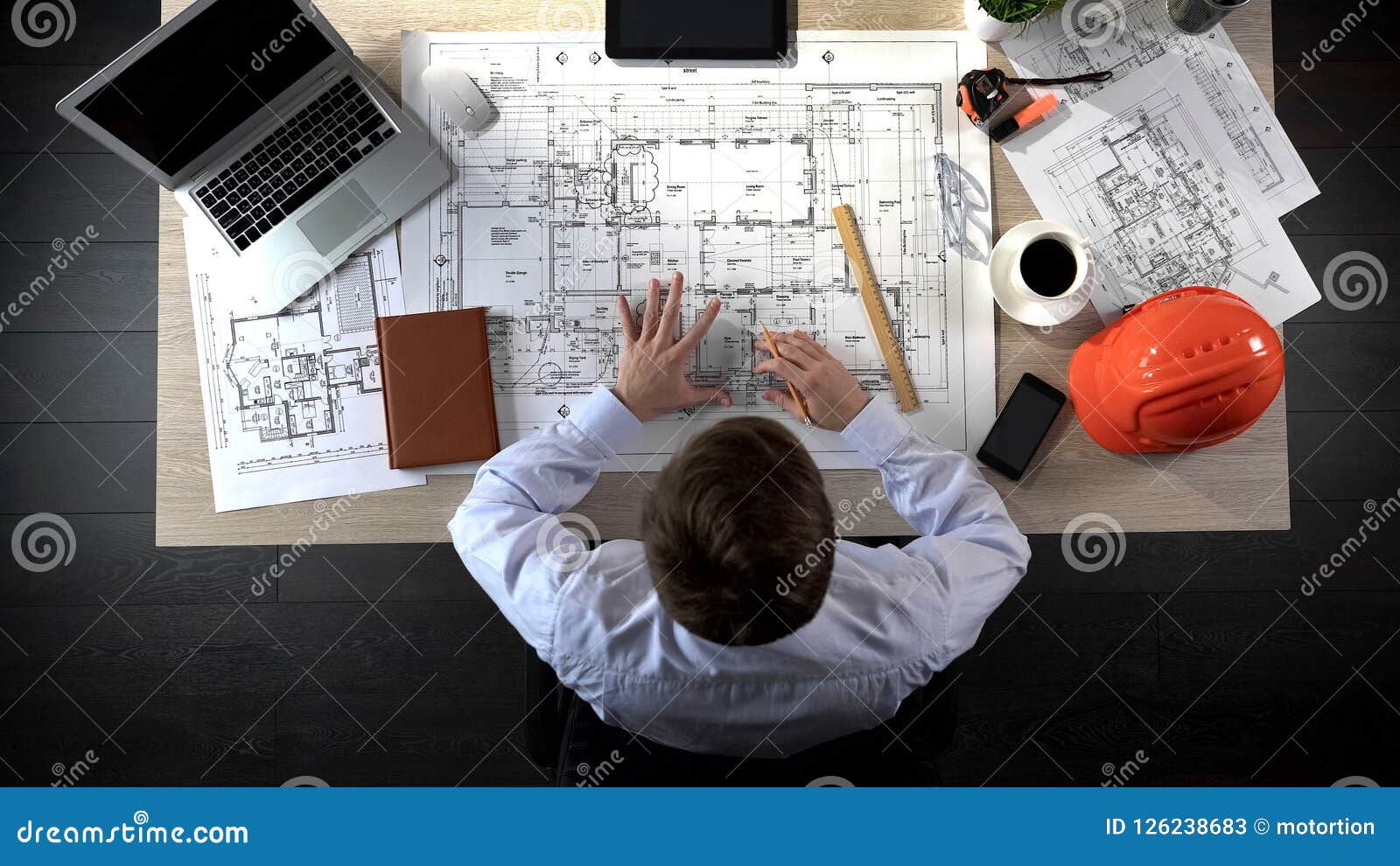 Engineer Nervously Checking Drawings before Beginning of Building ...