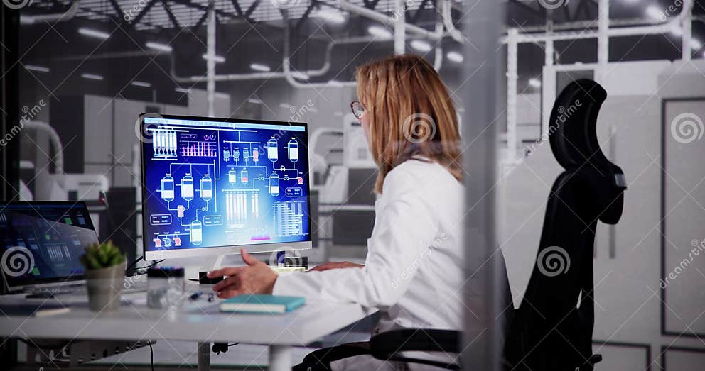 Engineer in Office Analyzing Software Data Stock Image - Image of ...