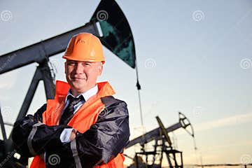 Engineer in an Oil field stock image. Image of inspector - 21478113