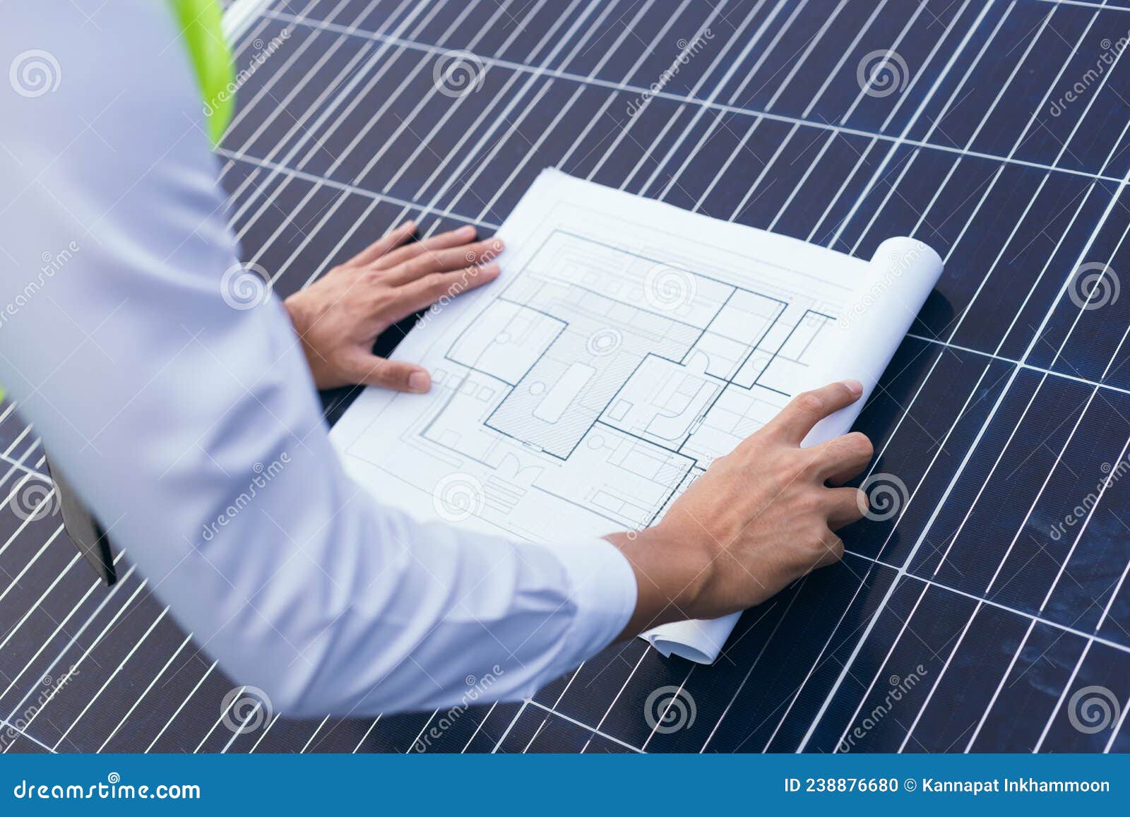 Engineer Open Blueprint of Solar Farm Project on Solar Cells Panel ...