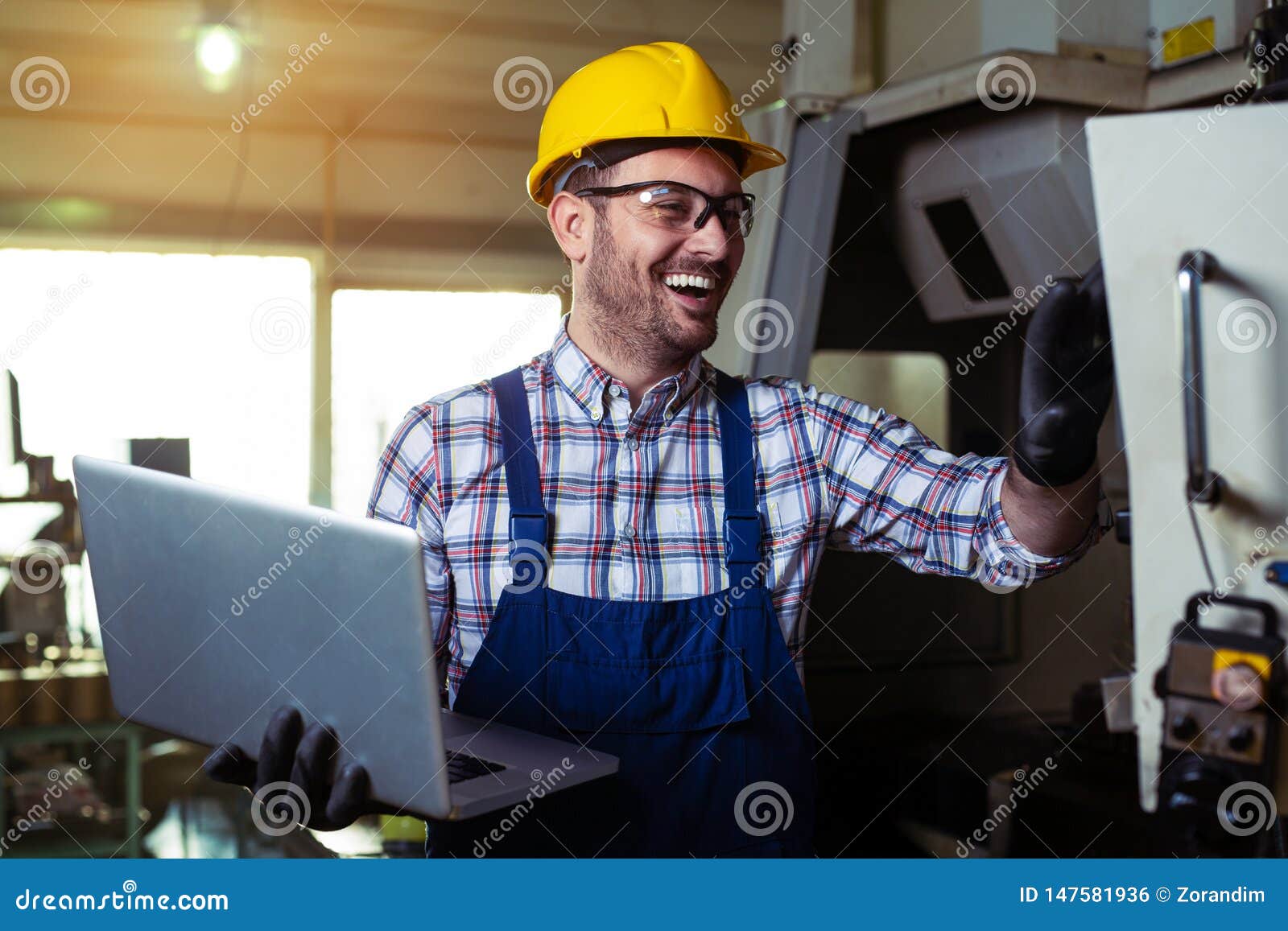Engineer Operating CNC Machinery in Factory Stock Photo - Image of ...