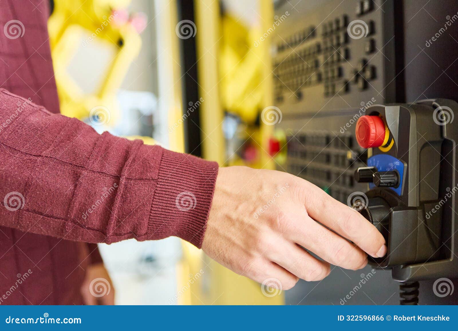 Engineer Operating Industrial Robot Controller in Manufacturing ...