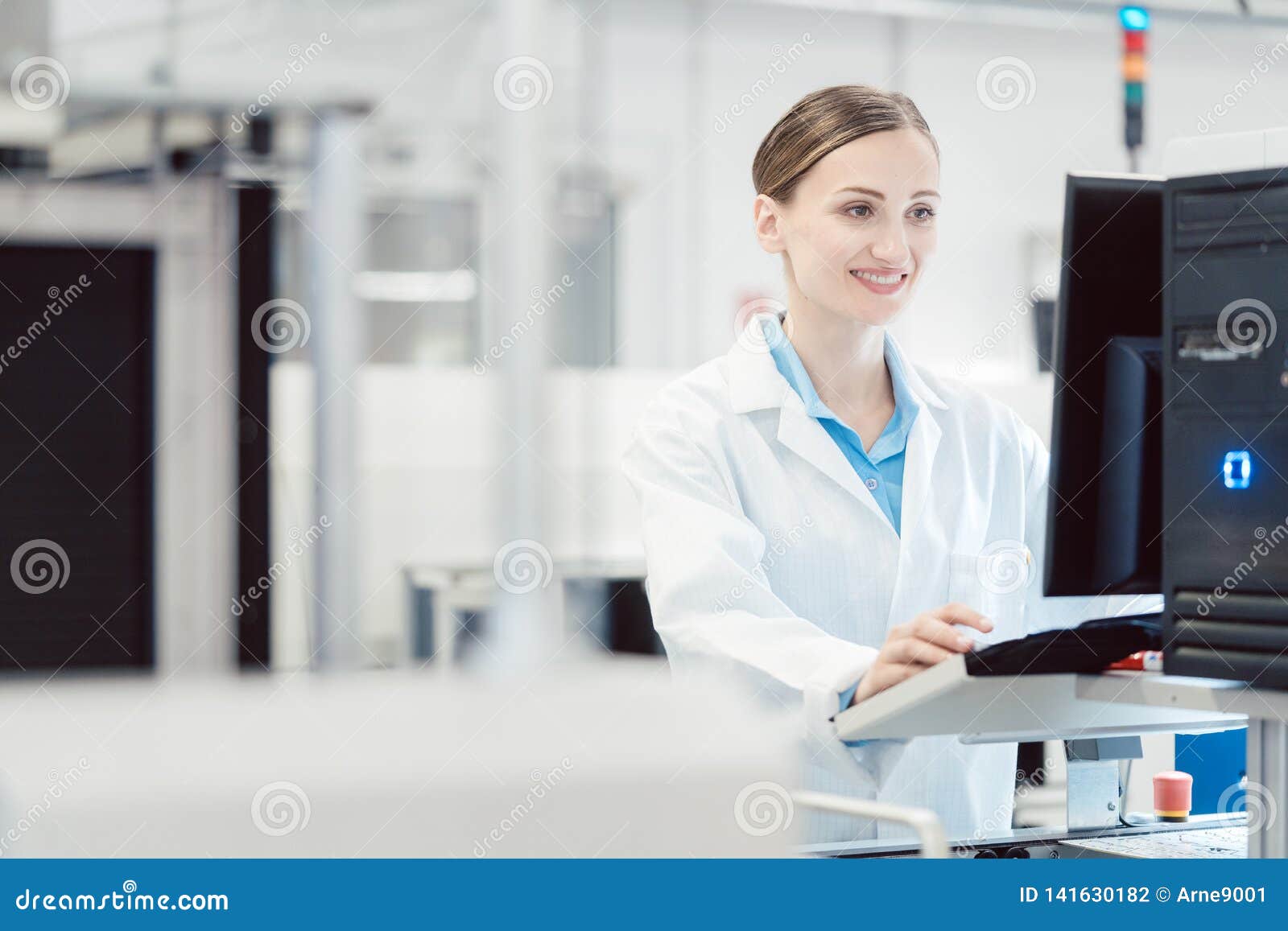 Engineer Operating Manufacturing Line in Electronics Factory Stock ...