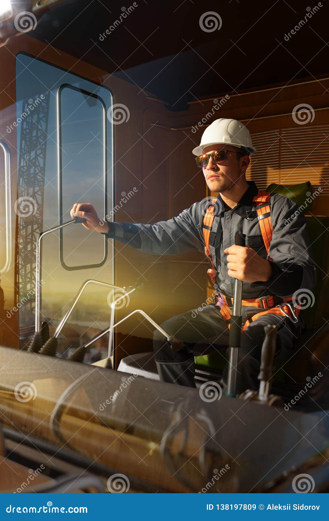 Engineer Operator Crane in Action . he Sit a Top in Crane Cabin and ...