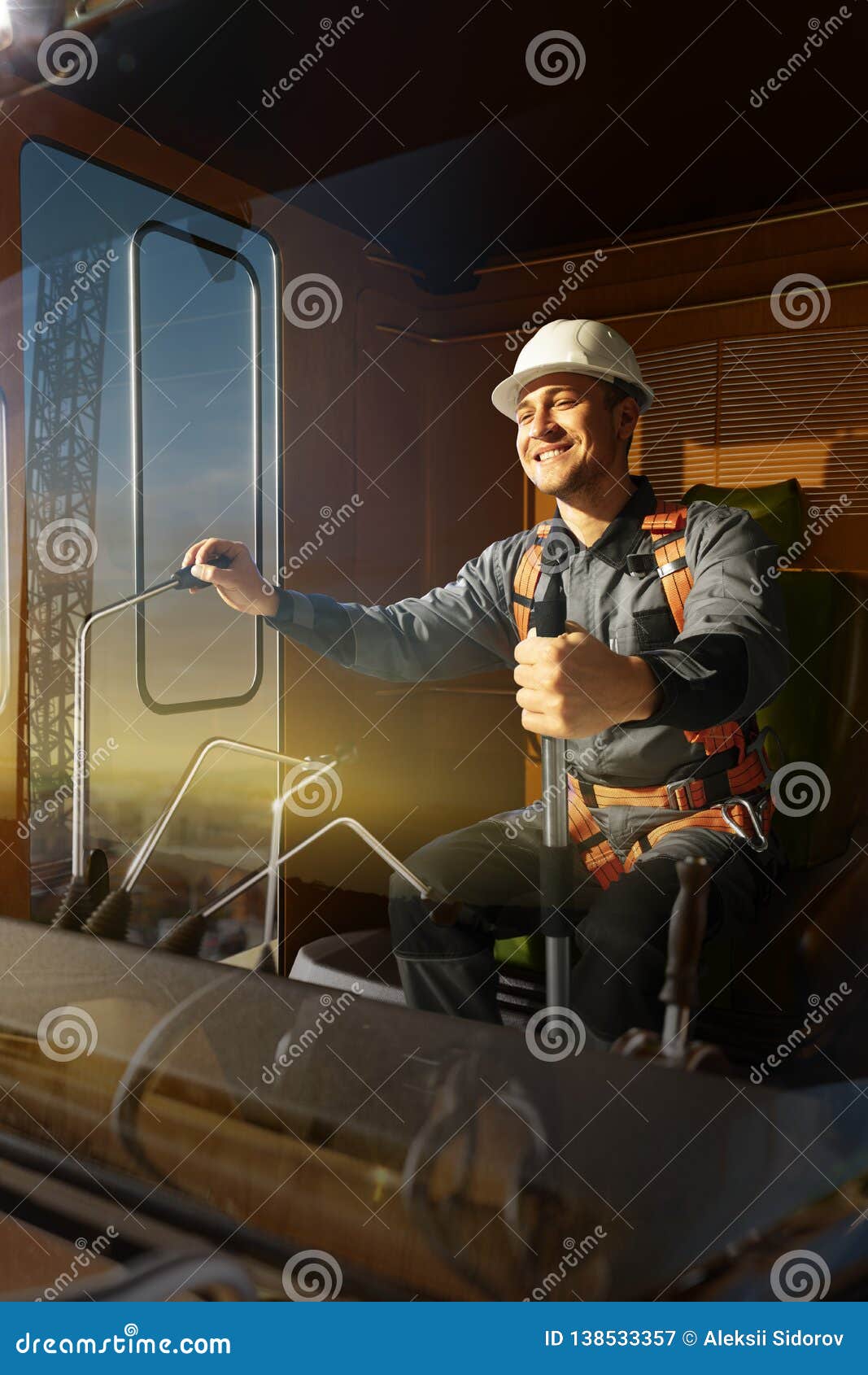 Engineer Operator Crane in Action . he Sit a Top in Crane Cabin and ...