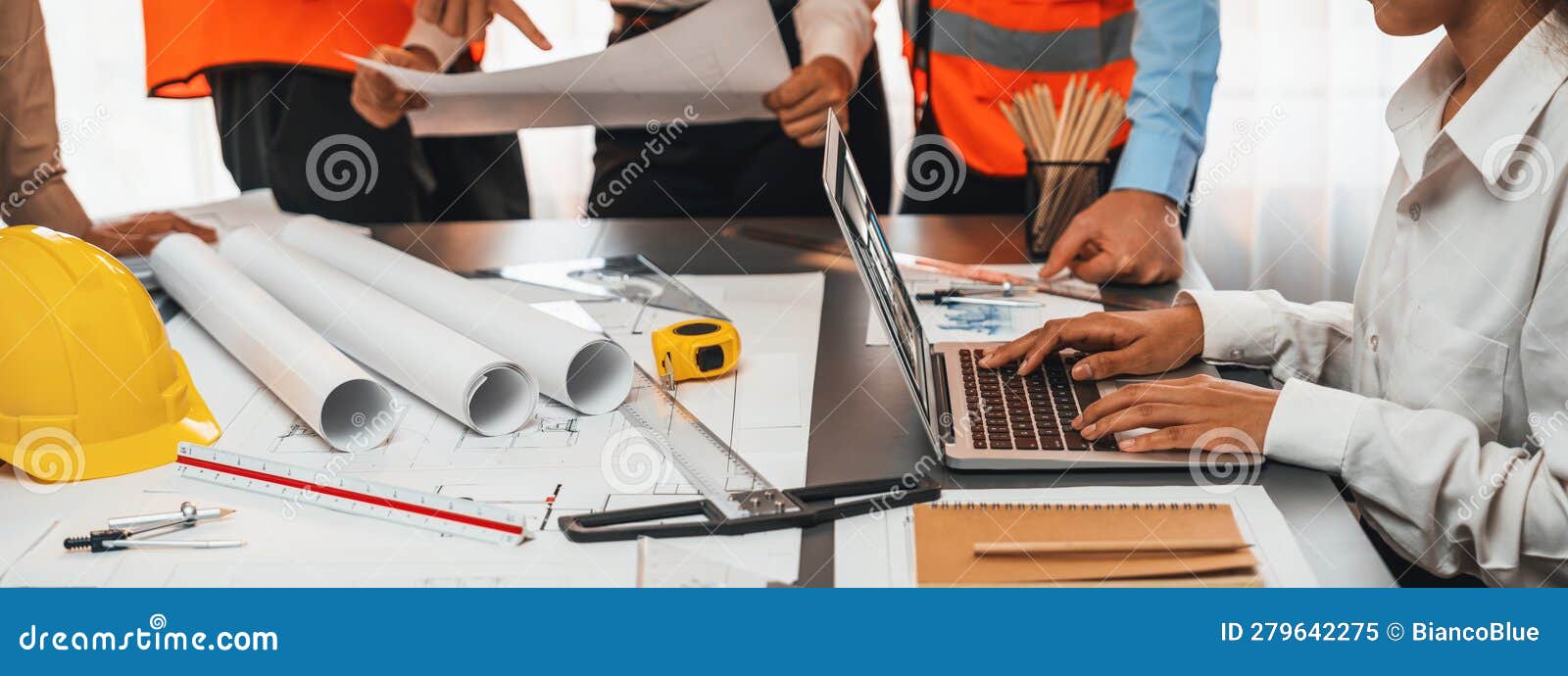 Engineer Partner Drawing and Working on Blueprint Design Together ...