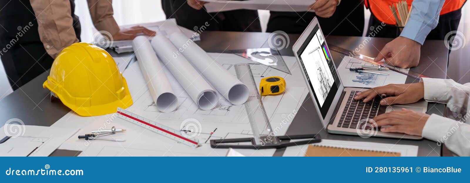 Engineer Partner Drawing and Working on Blueprint Design Together ...