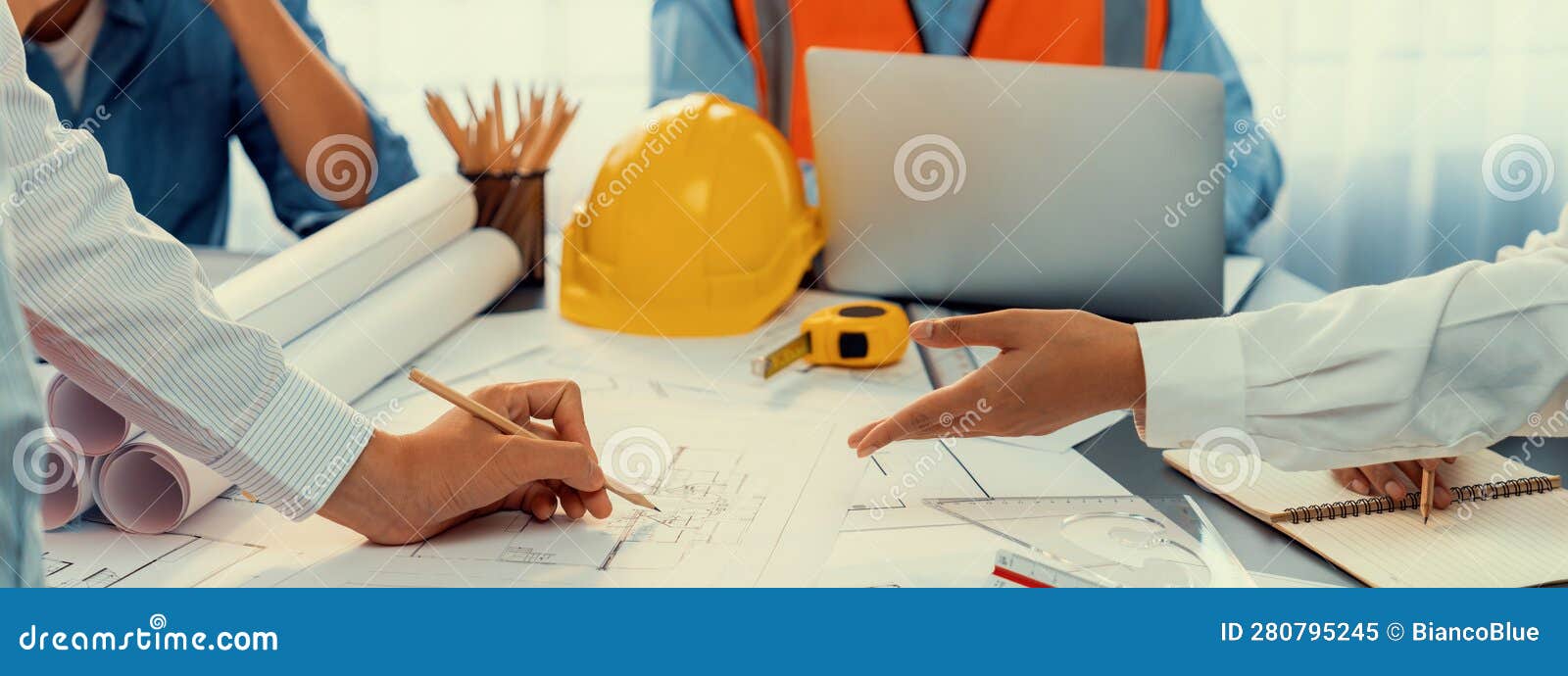 Engineer Partner Drawing and Working on Blueprint Design Together ...