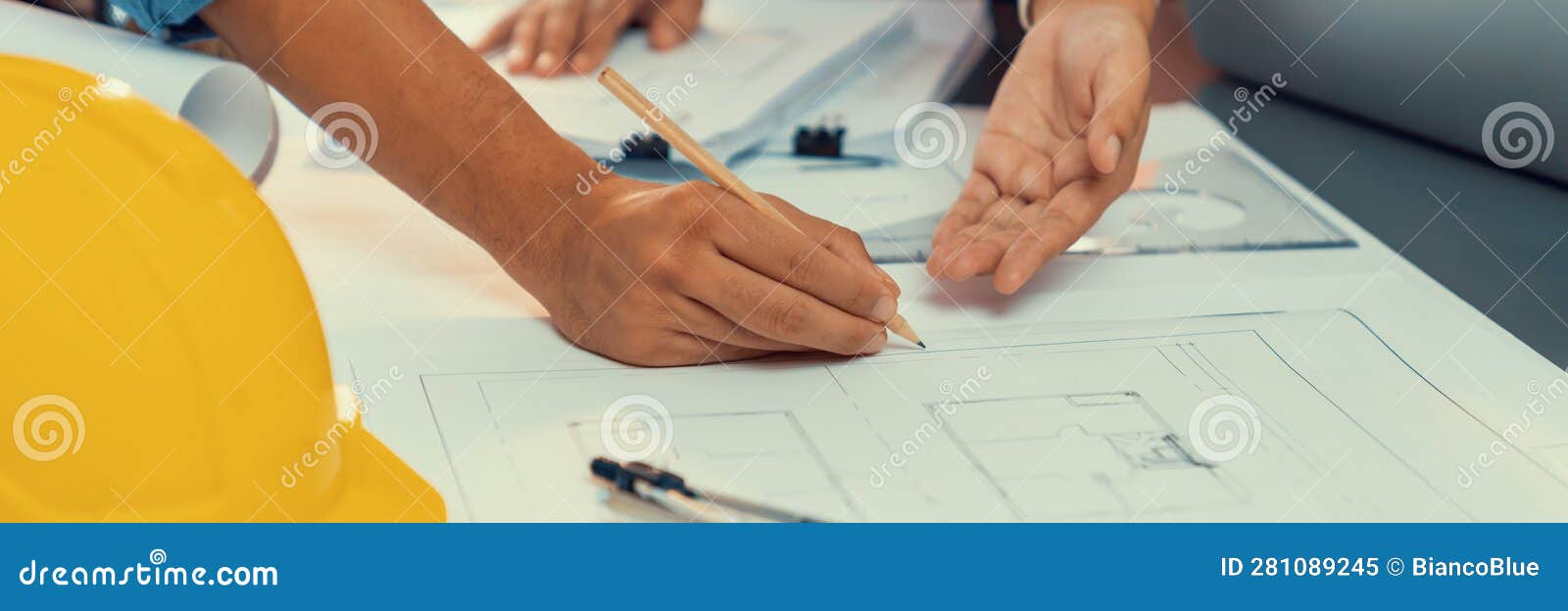 Engineer Partner Drawing and Working on Blueprint Design Together ...