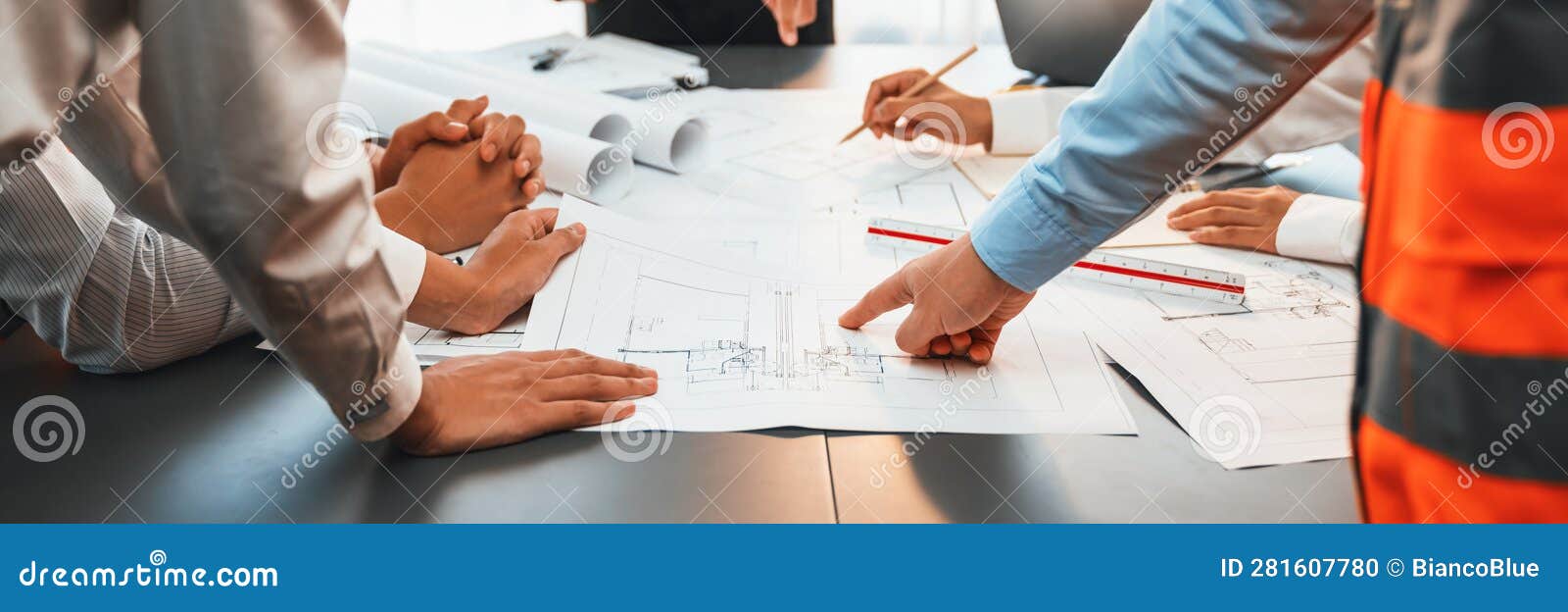 Engineer Partner Drawing and Working on Blueprint Design Together ...