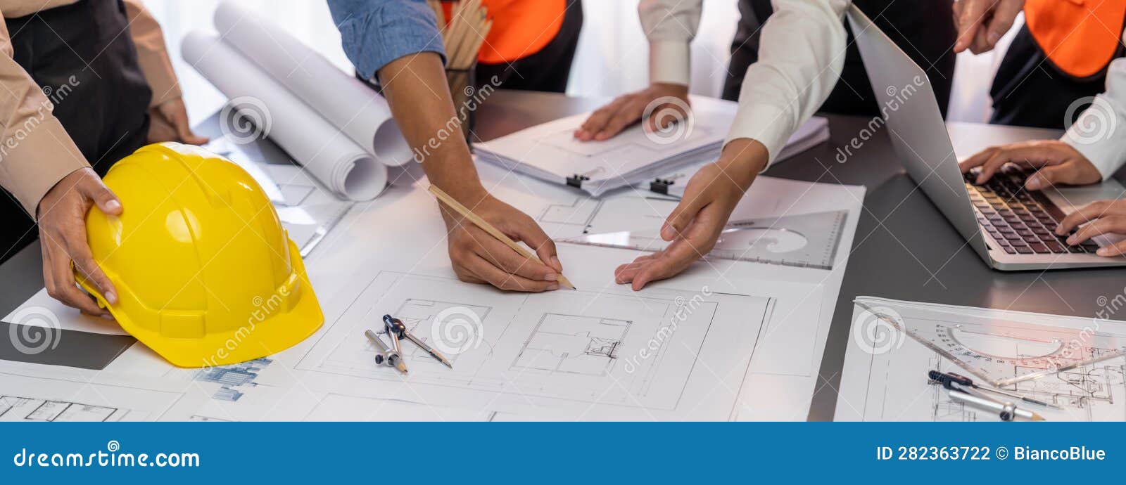 Engineer Partner Drawing and Working on Blueprint Design Together ...