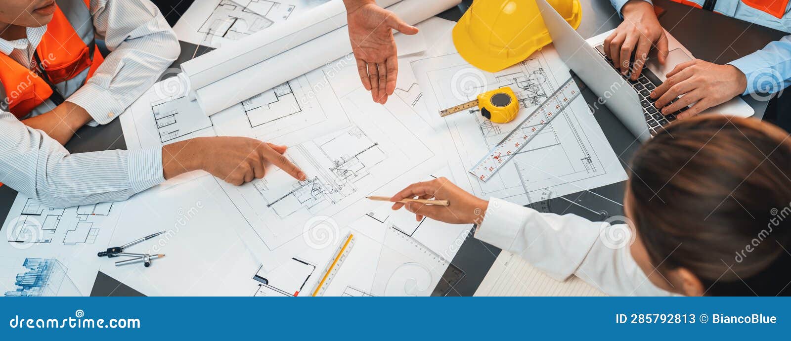 Engineer Partner Drawing and Working on Blueprint Design Together ...