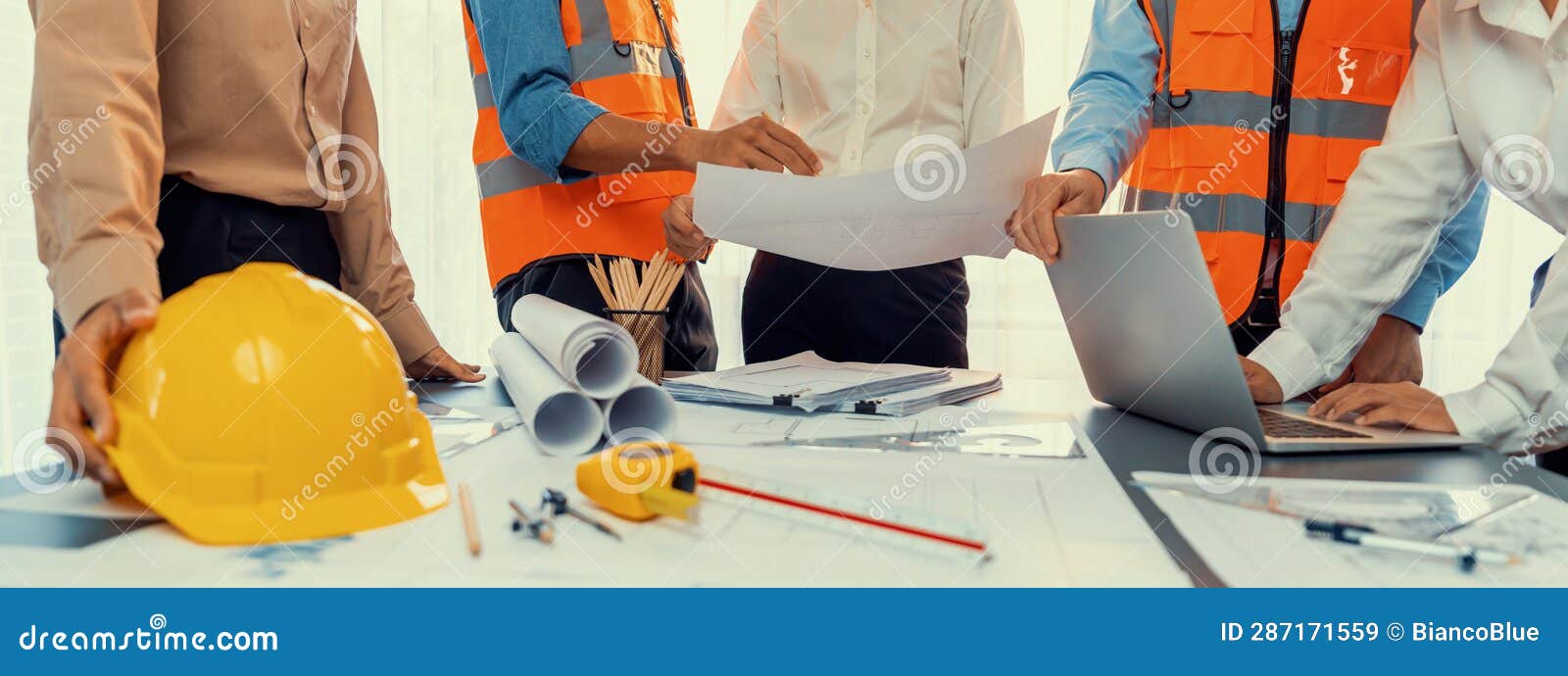 Engineer Partner Drawing and Working on Blueprint Design Together ...