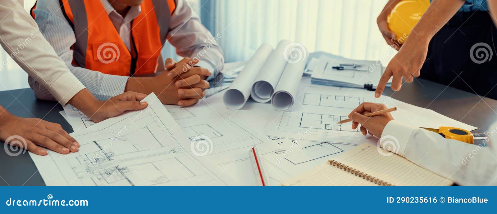 Engineer Partner Drawing and Working on Blueprint Design Together ...