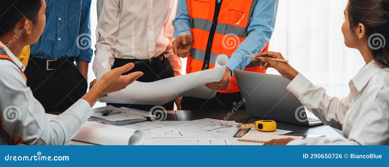 Engineer Partner Drawing and Working on Blueprint Design Together ...