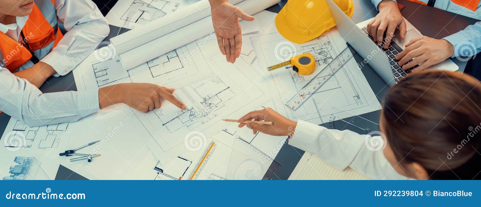 Engineer Partner Drawing and Working on Blueprint Design Together ...