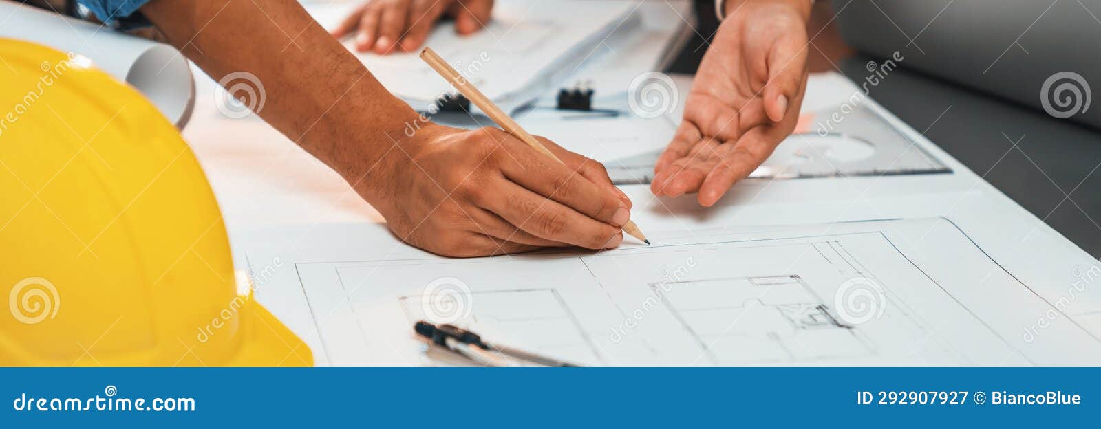 Engineer Partner Drawing and Working on Blueprint Design Together ...