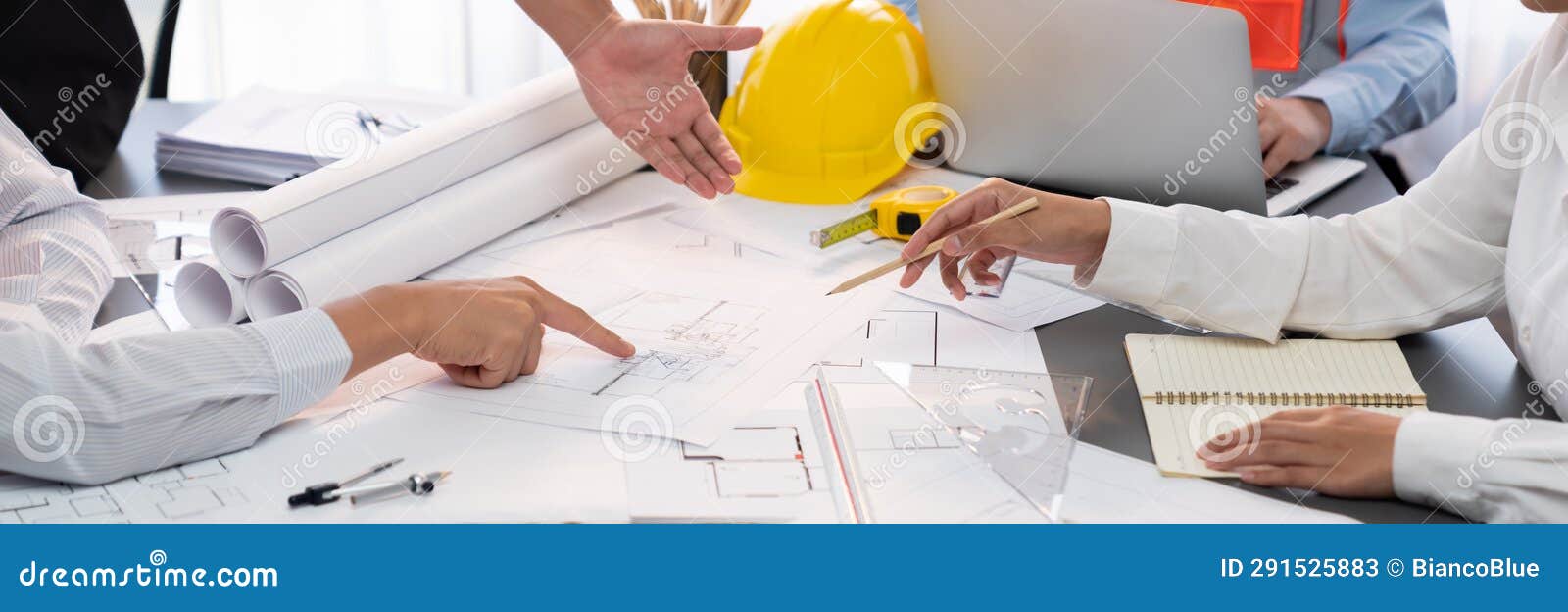 Engineer Partner Drawing and Working on Blueprint Design Together ...