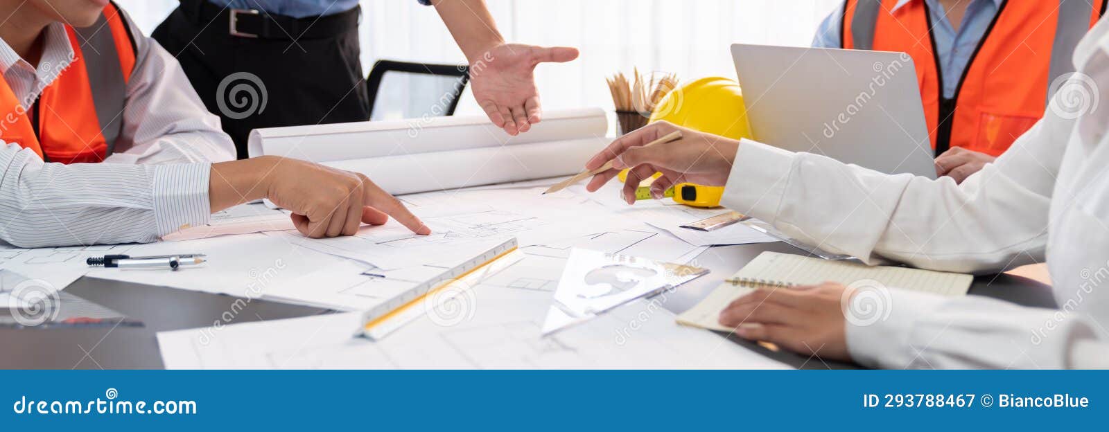 Engineer Partner Drawing and Working on Blueprint Design Together ...