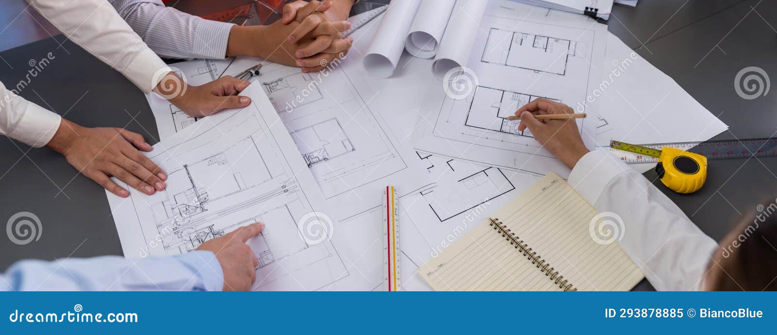 Engineer Partner Drawing and Working on Blueprint Design Together ...