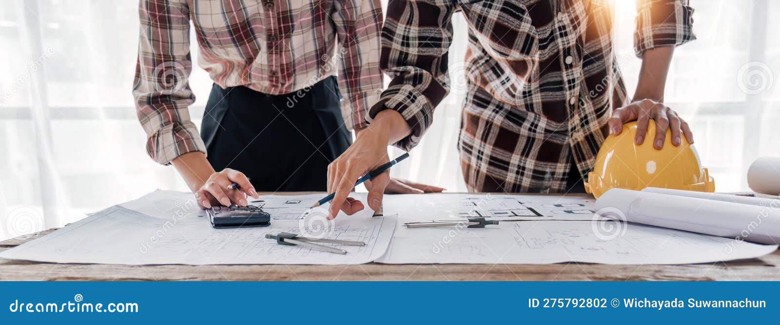 Engineer People Meeting Working and Pointing at a Drawings in Office ...