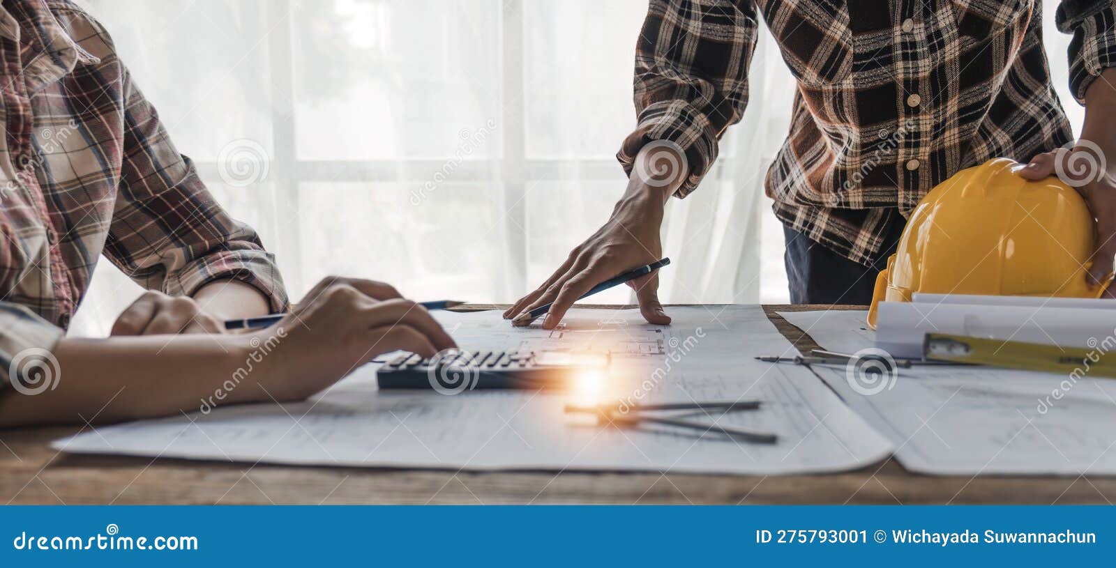 Engineer People Meeting Working and Pointing at a Drawings in Office ...