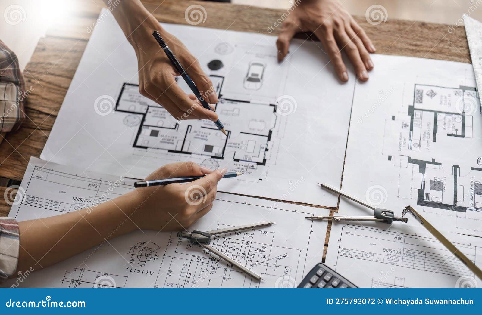 Engineer People Meeting Working and Pointing at a Drawings in Office ...