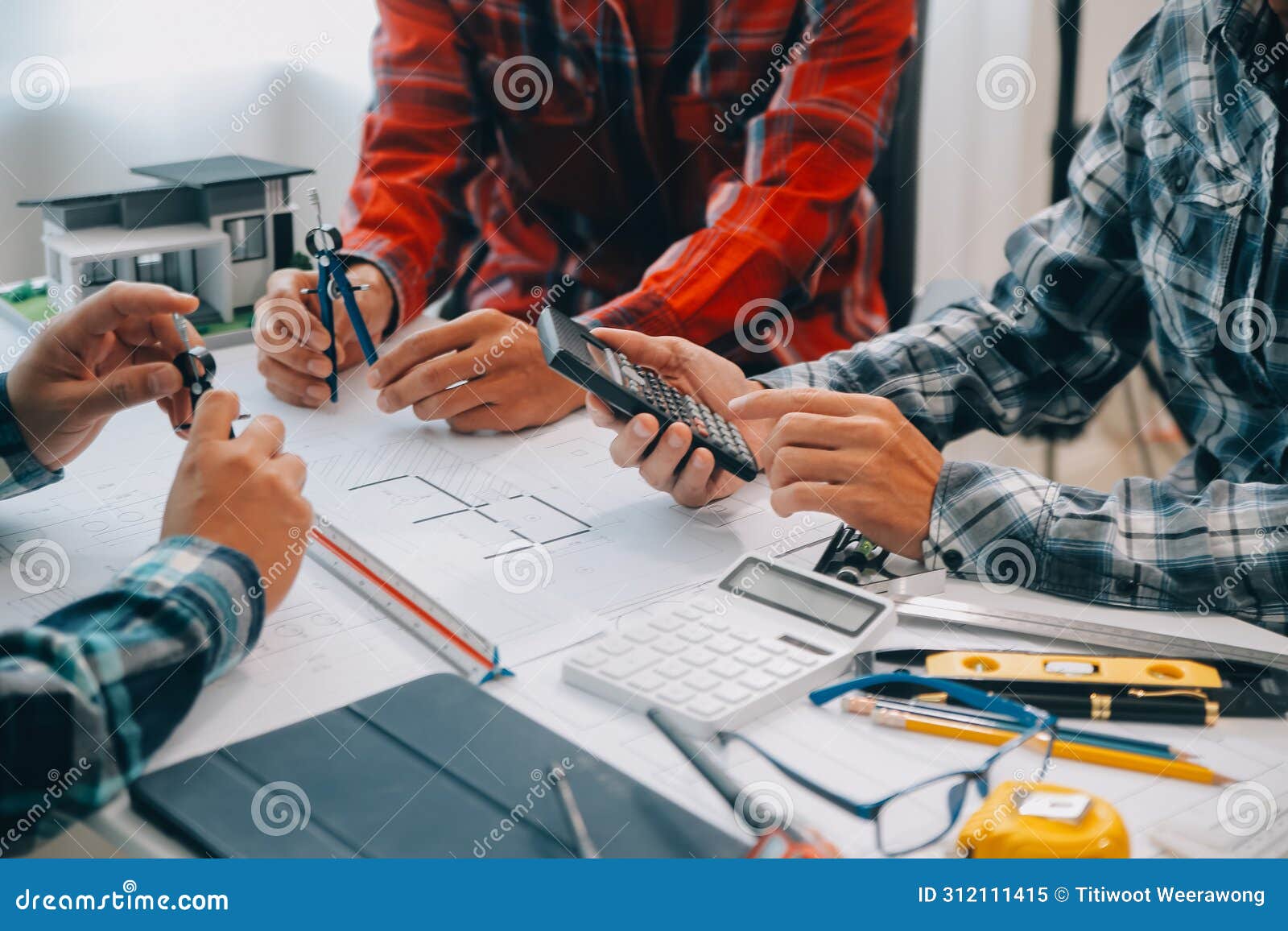 Engineer People Meeting Working and Pointing at a Drawings in Office ...