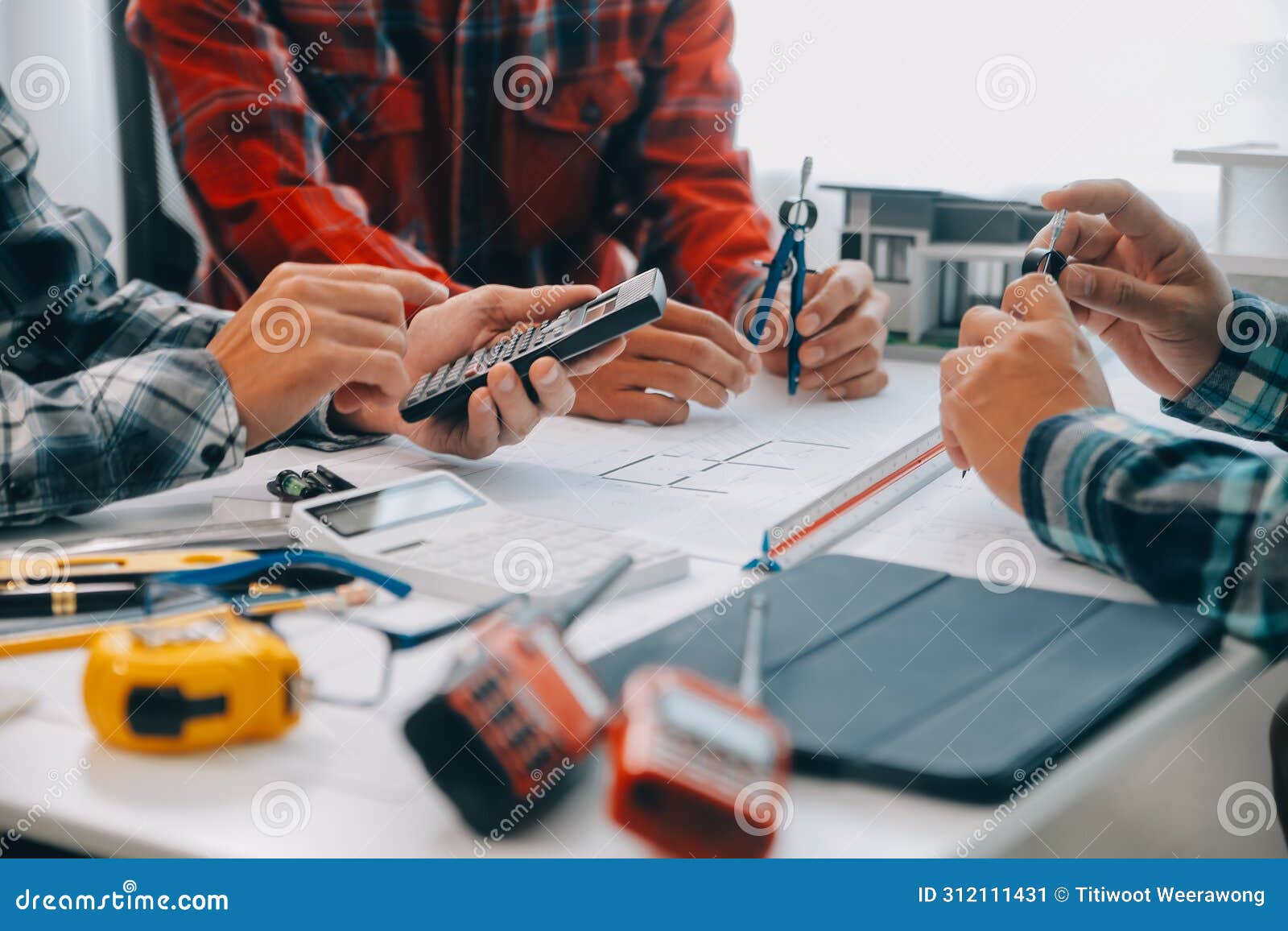 Engineer People Meeting Working and Pointing at a Drawings in Office ...
