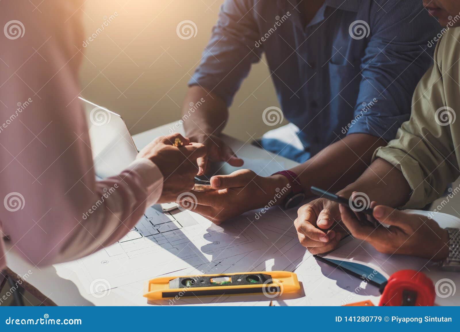 Engineer People Meeting Working and Pointing at a Drawings in Office ...