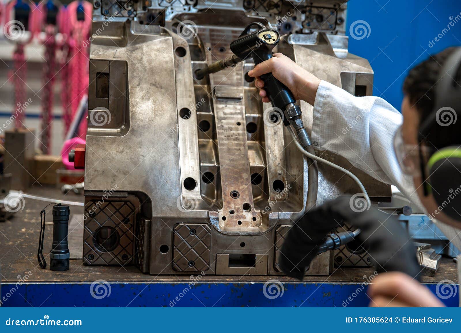 The Engineer Performs Freezing of the Casting Using a Special Machine ...