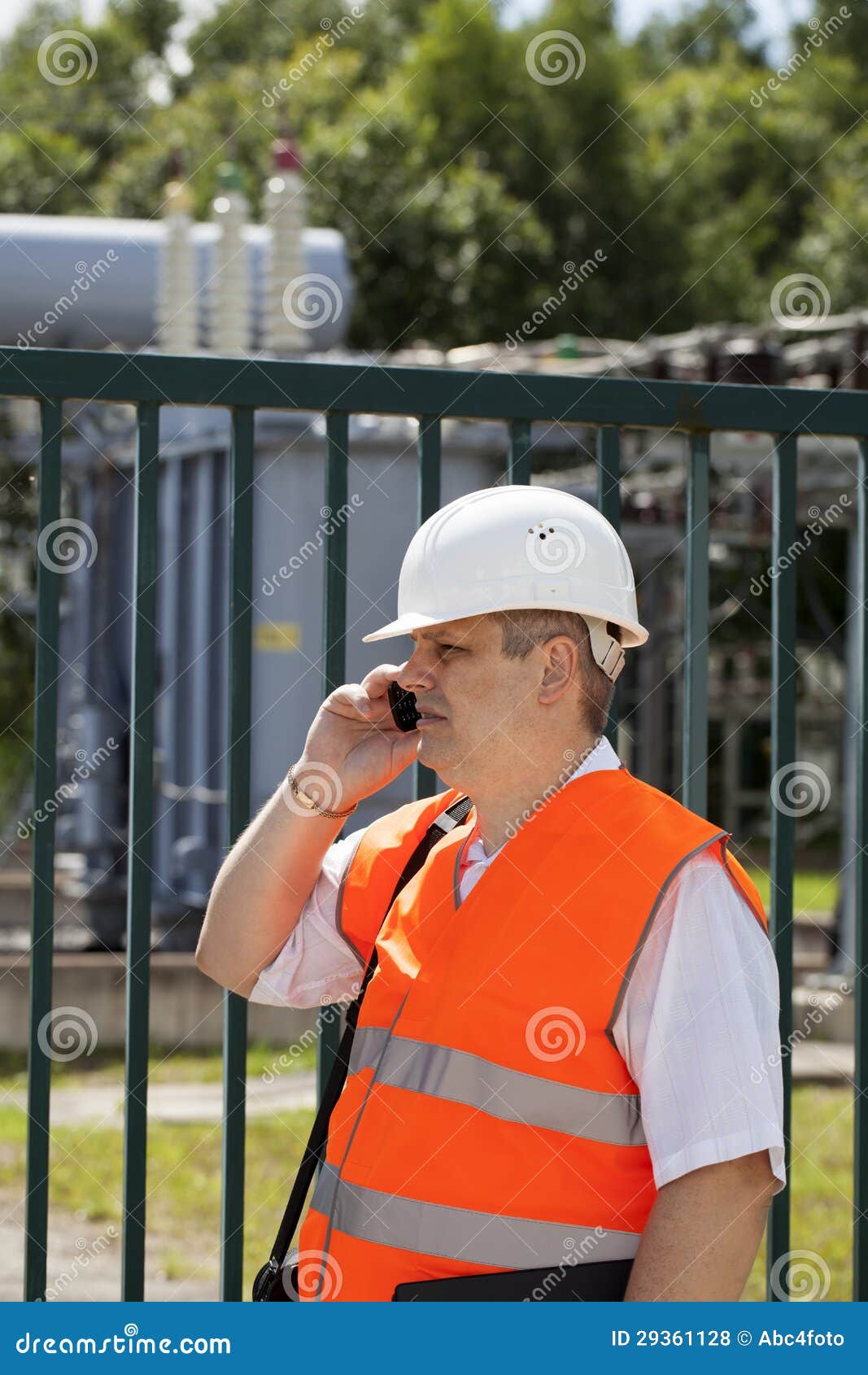 Engineer with phone stock photo. Image of factory, builder - 29361128
