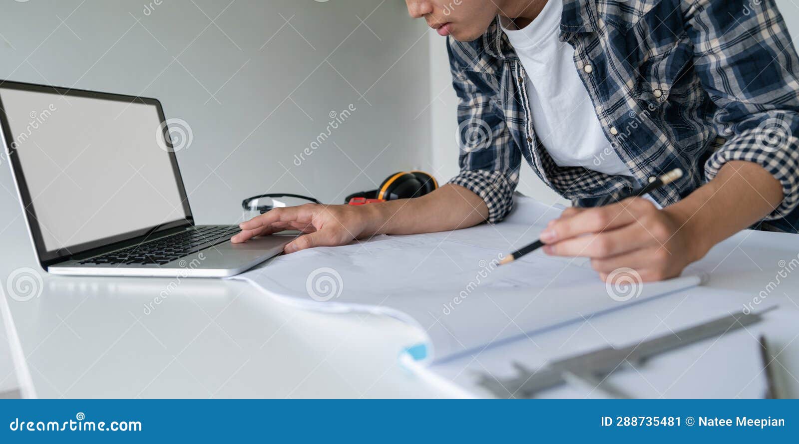 Engineer Planing and Working on Table Construction Working at Office ...