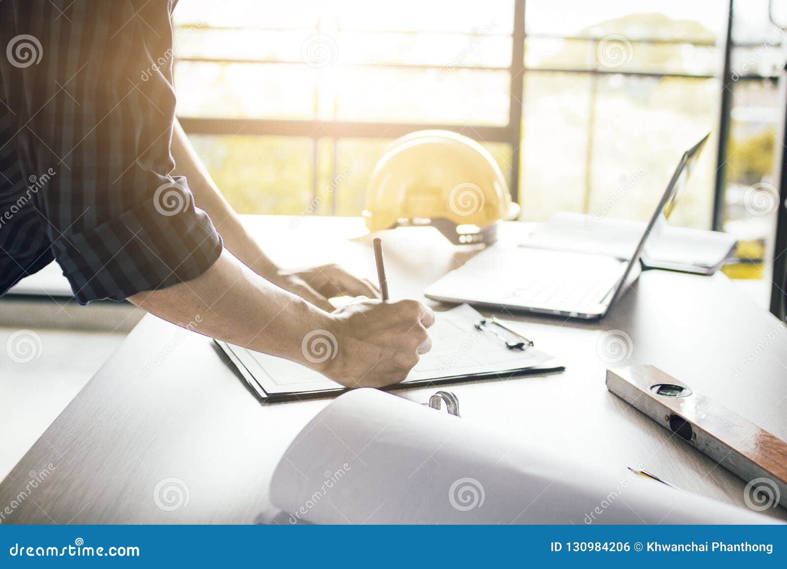 Engineer Planning Work on Blue Print on Working Table, Foreman C Stock ...
