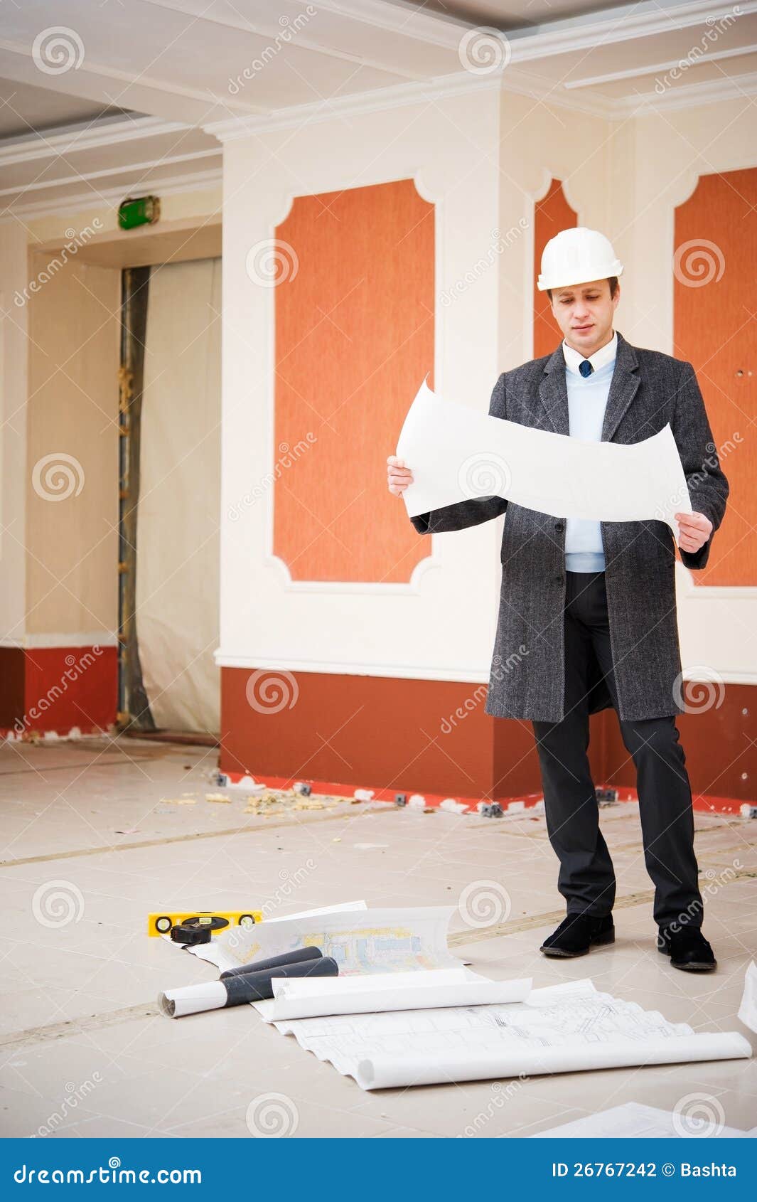 Engineer with plans. stock photo. Image of contractor - 26767242