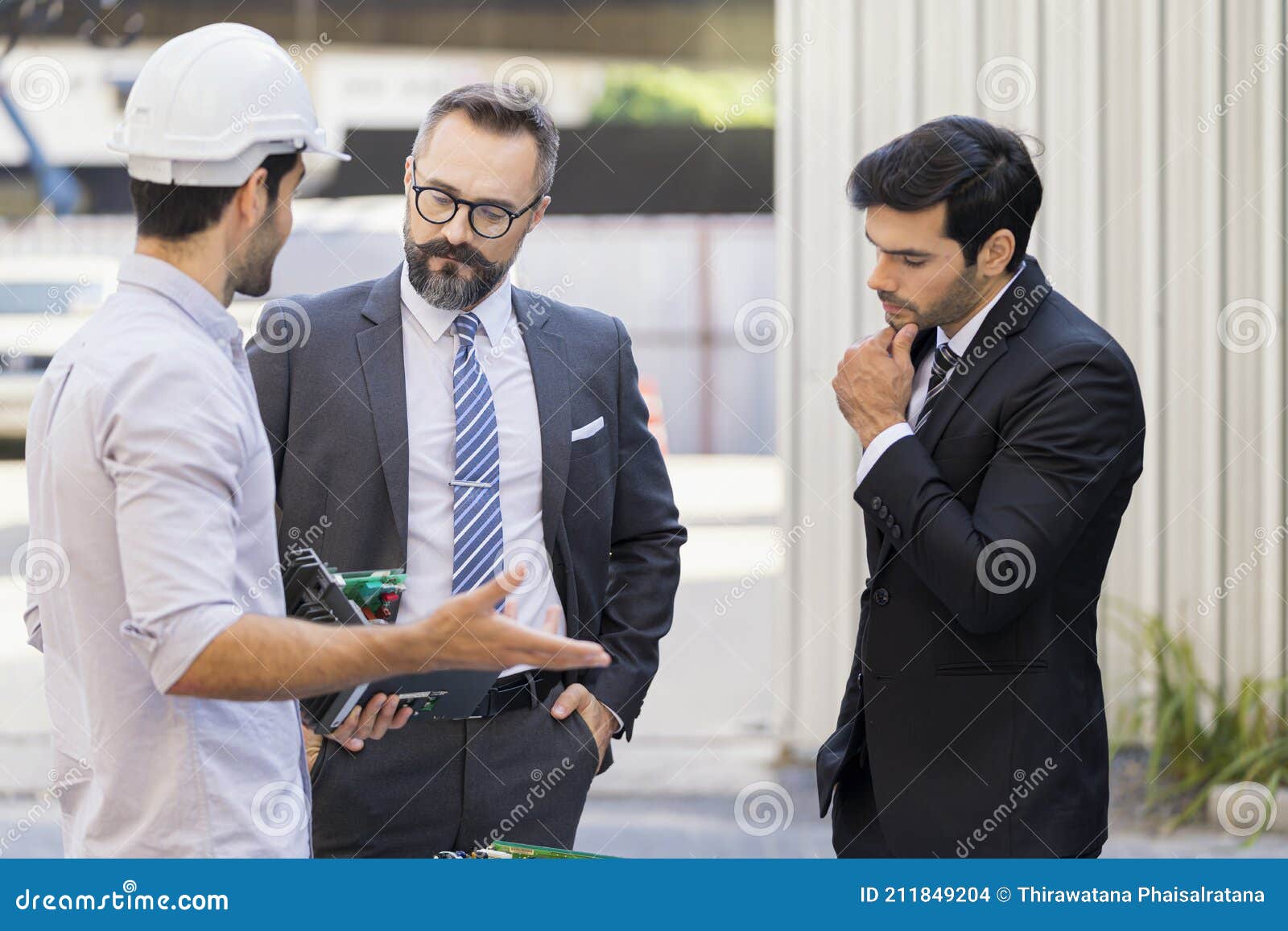 Engineer Presenting the Solar Cell Work for Businessman. Engineer ...