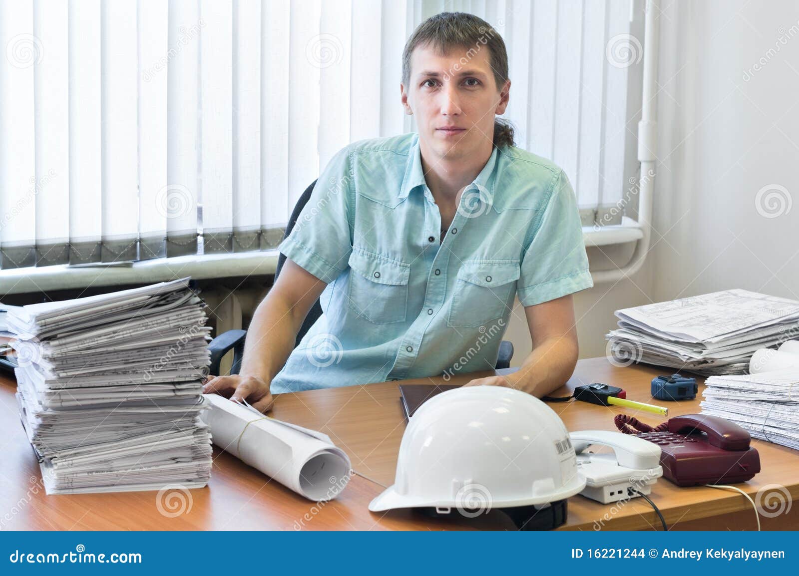 Engineer with Project Drawings in Office Stock Photo - Image of ...